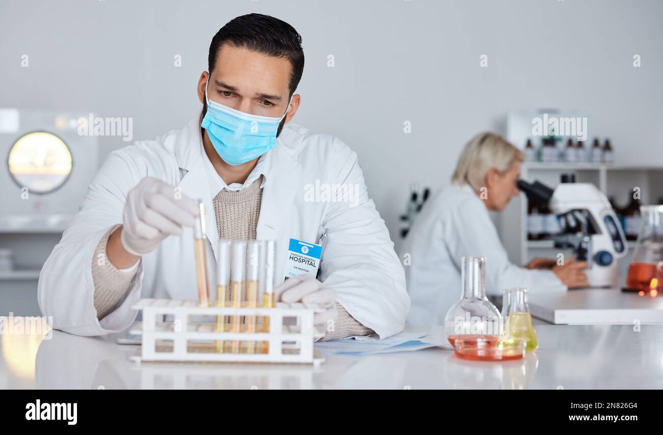 Scientist man, test tube and laboratory for covid 19 research for goal ...