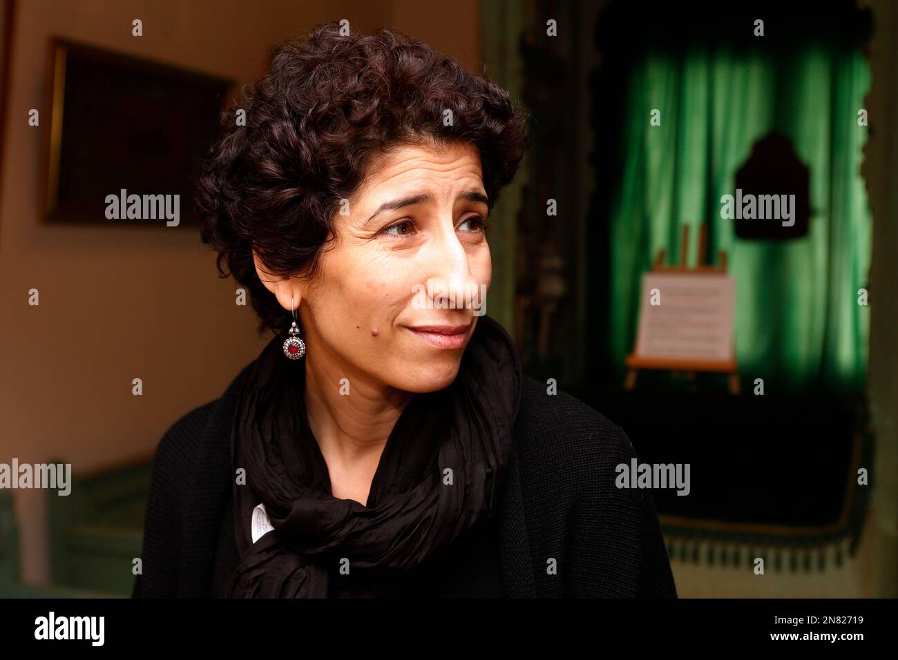 In this photo taken Friday, Feb. 15, 2013, Zhor Rehihil, the curator of ...