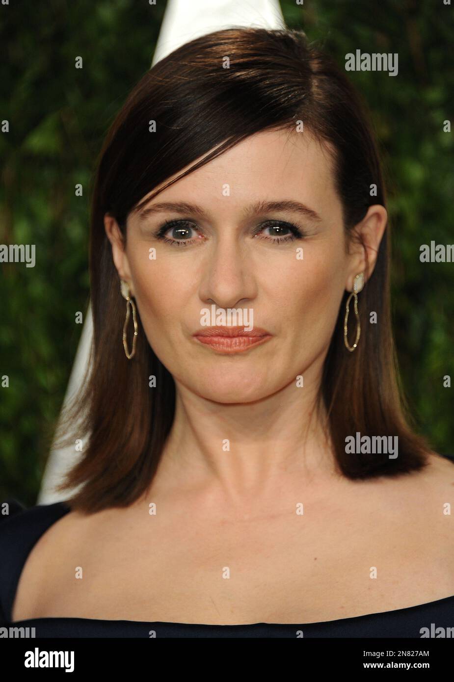 Actress Emily Mortimer arrives at the 2013 Vanity Fair Oscars Viewing ...