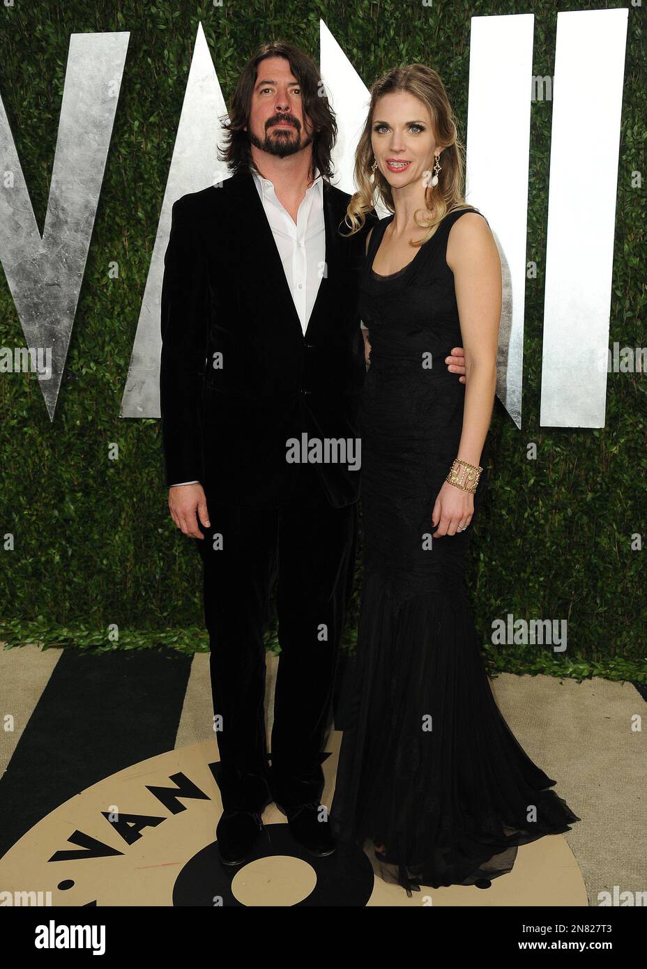 From left, musician Dave Grohl and wife Jordyn Blum Grohl arrive at the ...