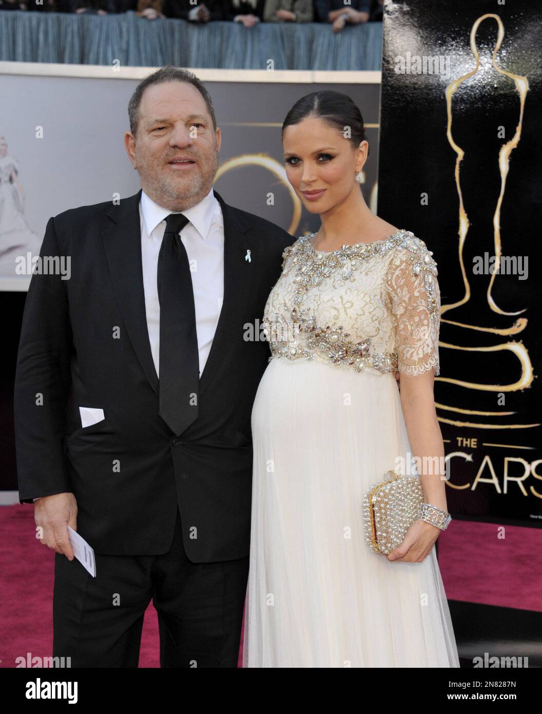 Producer Harvey Weinstein, left, and fashion designer Georgina Chapman ...