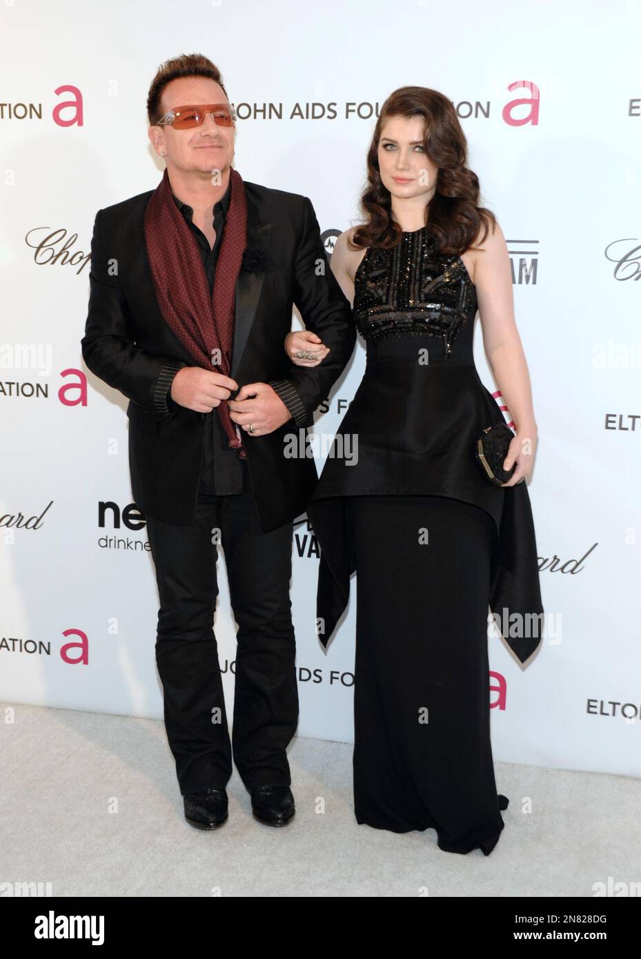 Singer Bono, left, and his daughter, actress Eve Hewson arrive at the ...