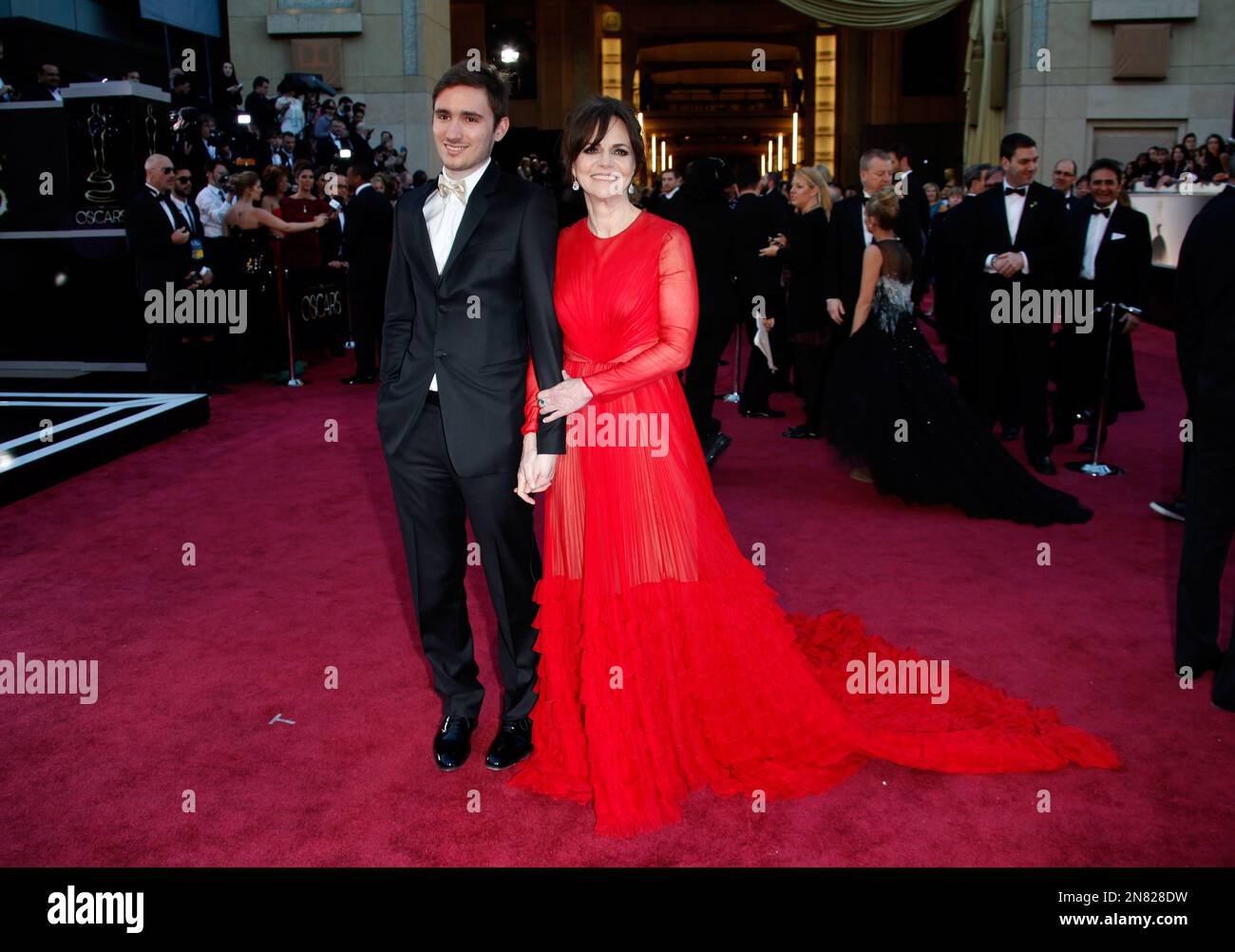 Actress Sally Field, right and Sam Greisman arrive at the Oscars at the ...