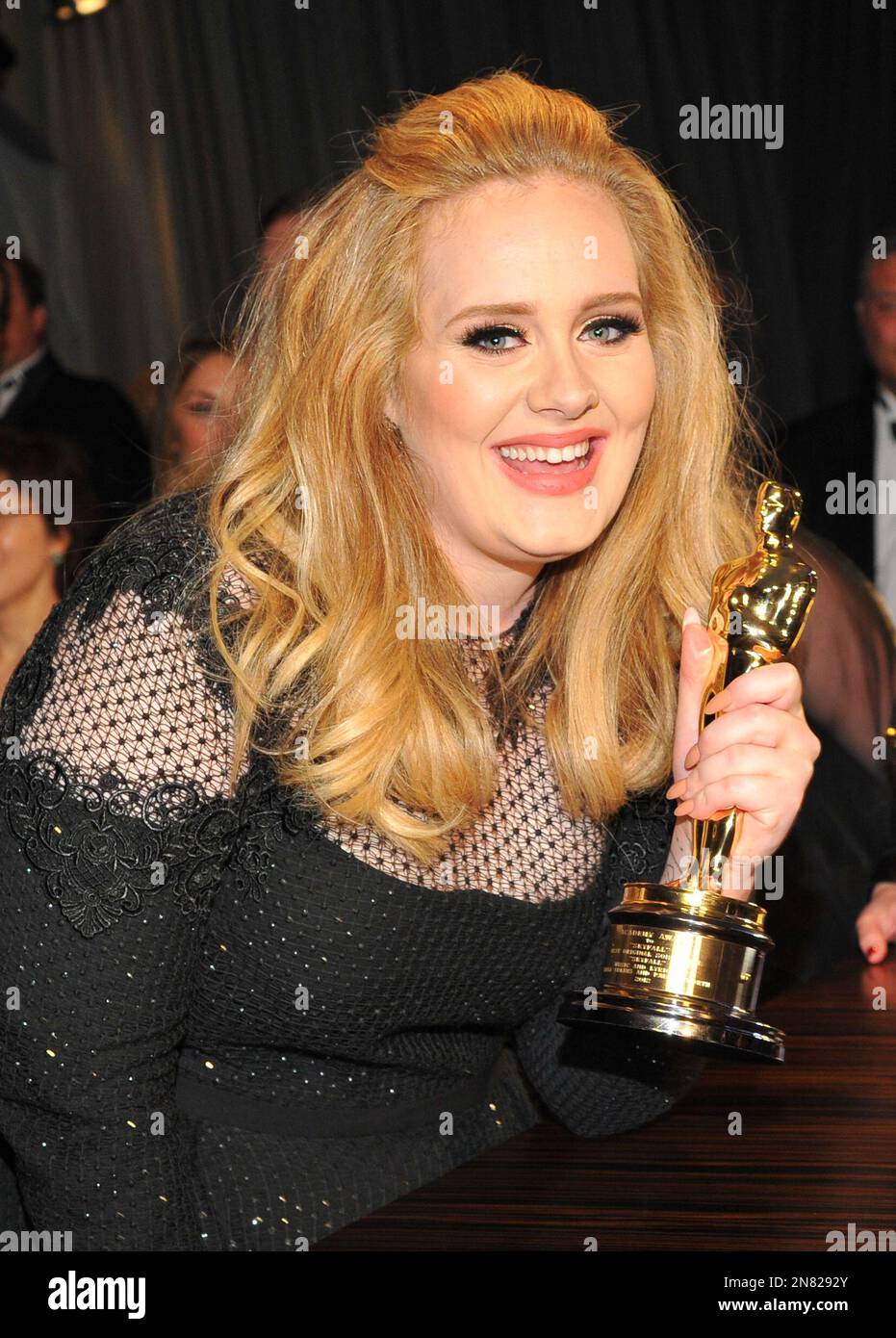 Singer Adele poses with her award for best original song for "Skyfall ...