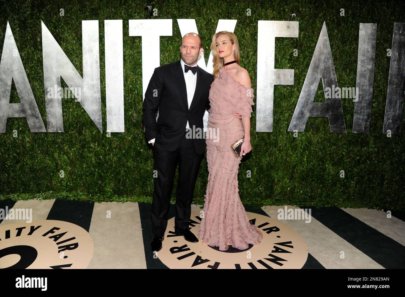 Actor Jason Statham, left, and partner Rosie Huntington-Whiteley arrive ...