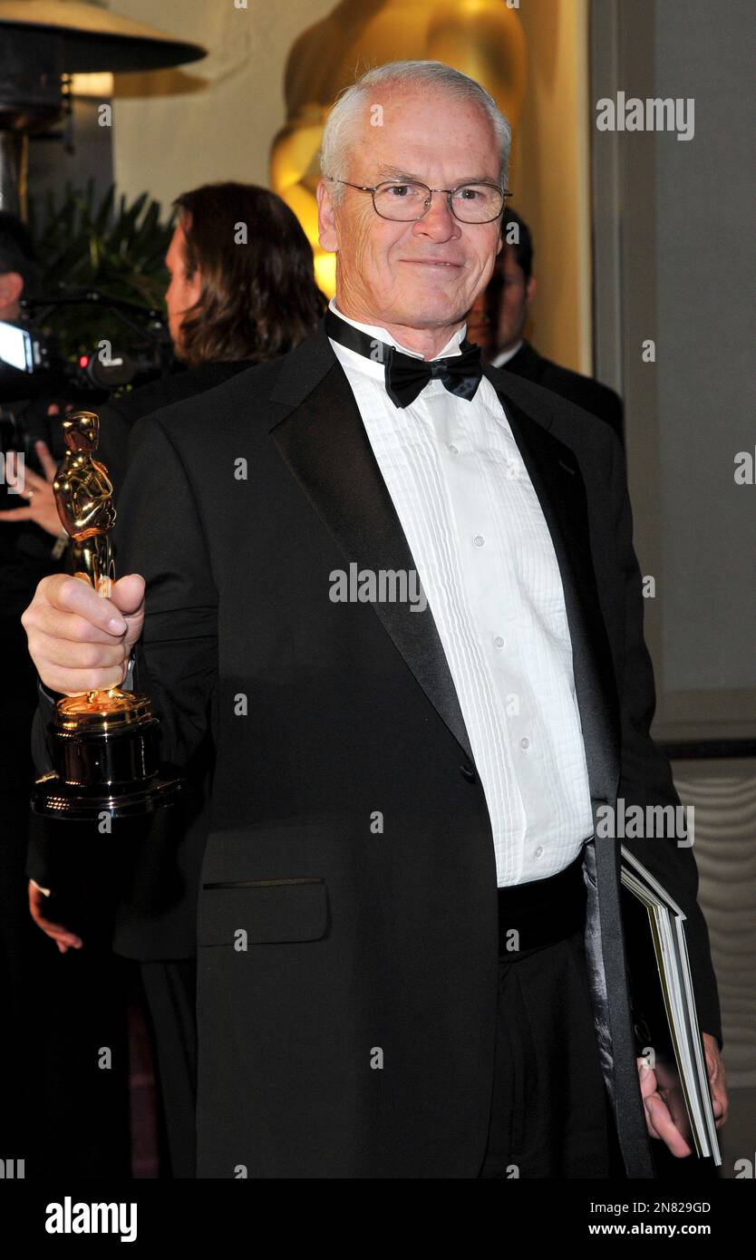 Donald R. Elliott poses with his award for best visual effects for ...
