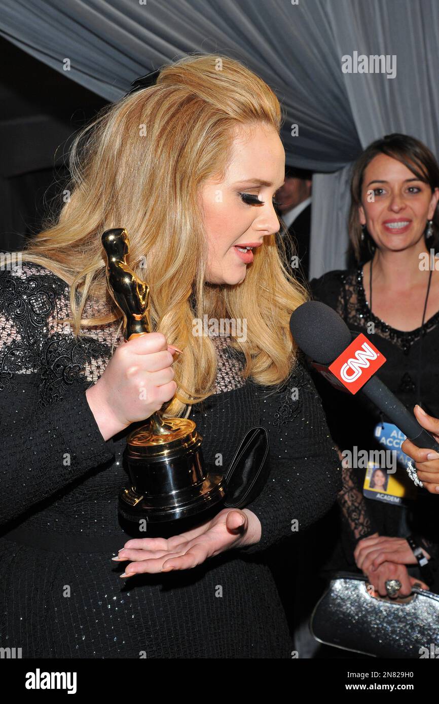Adele is interviewed at the Governor's Ball following the Oscars at the Dolby Theatre on Sunday ...