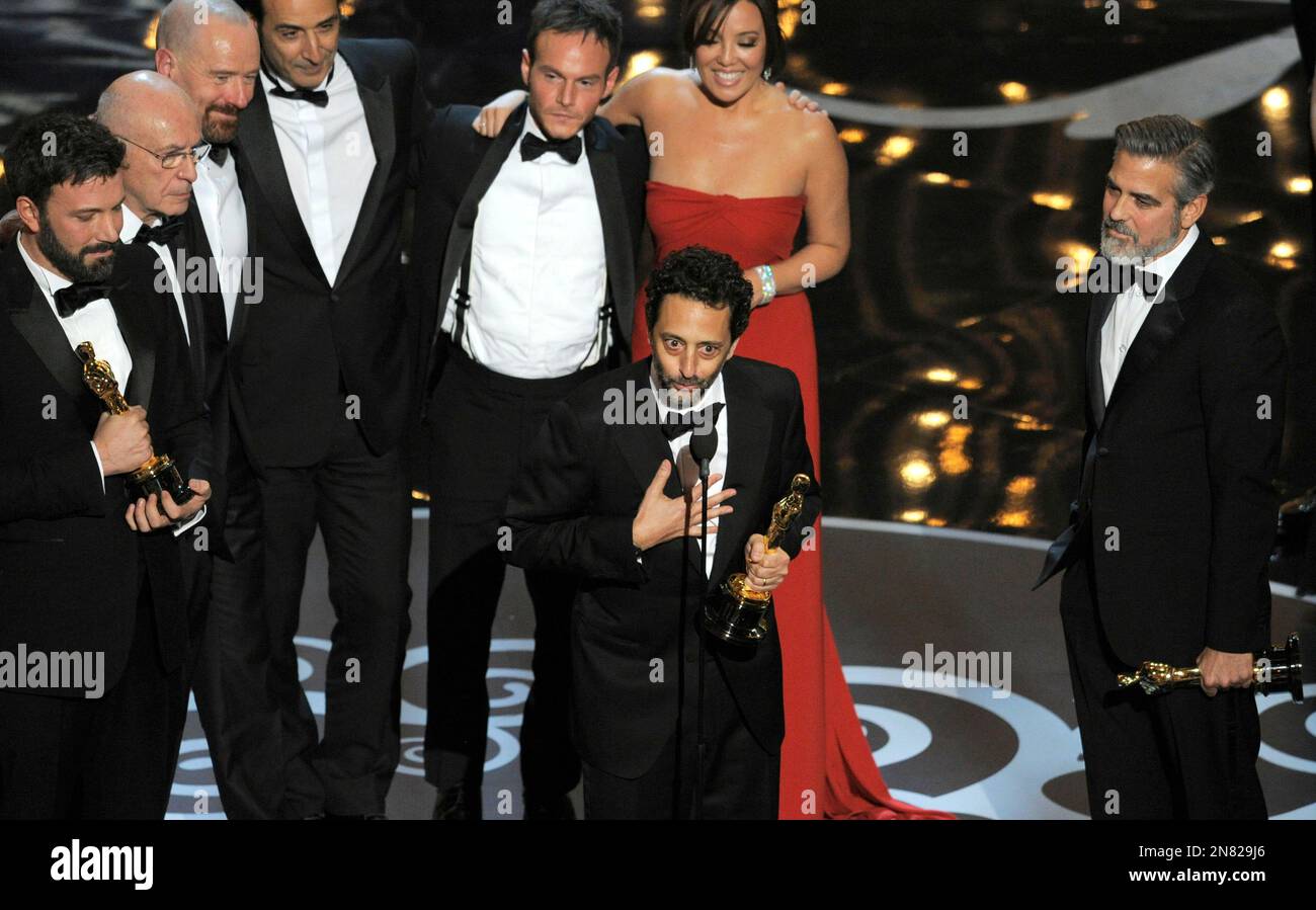 Producer Grant Heslov, center, accepts the award for best picture for ...