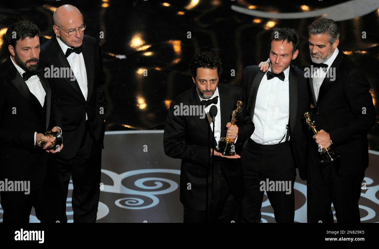 Producer Grant Heslov, center, accepts the award for best picture for ...