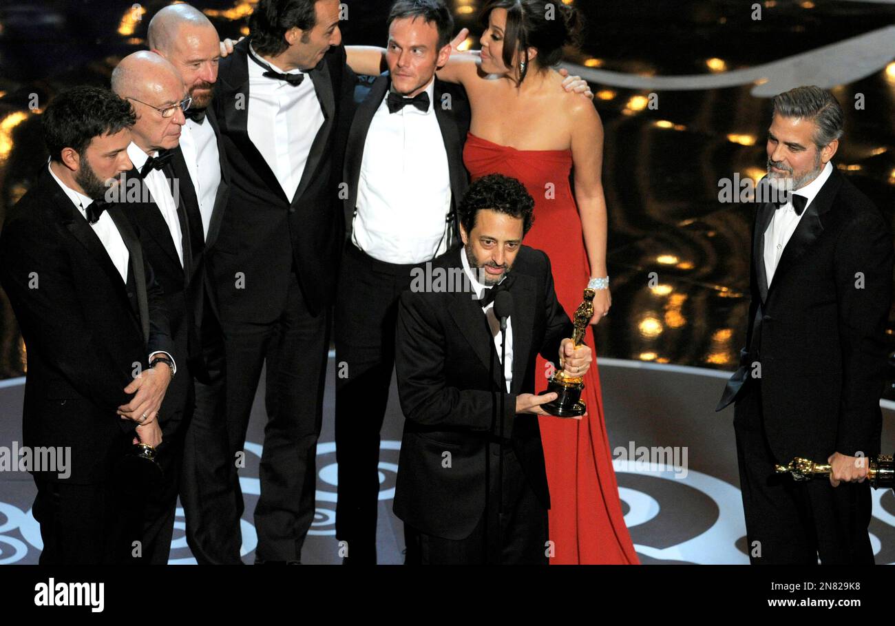 Producer Grant Heslov, center, accepts the award for best picture for ...