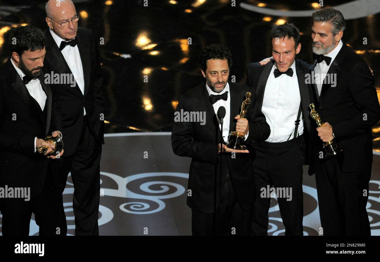 Producer Grant Heslov, center, accepts the award for best picture for ...
