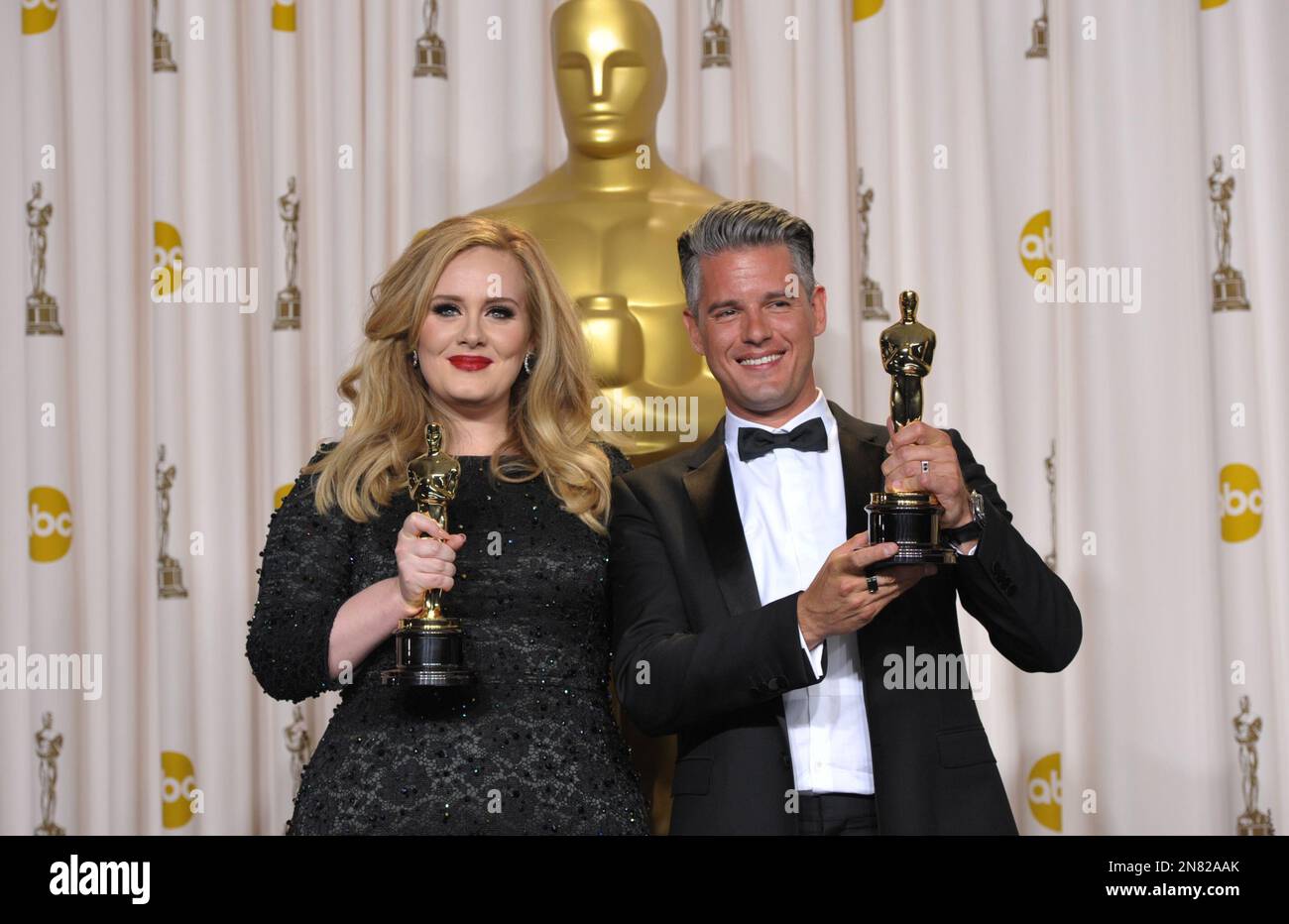 Adele and Paul Epworth pose with their award for best original song for "Skyfall" during the ...