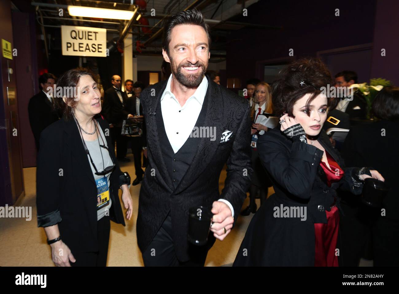 Actors Hugh Jackman, center, and Helena Bonham Carter, right, are ...
