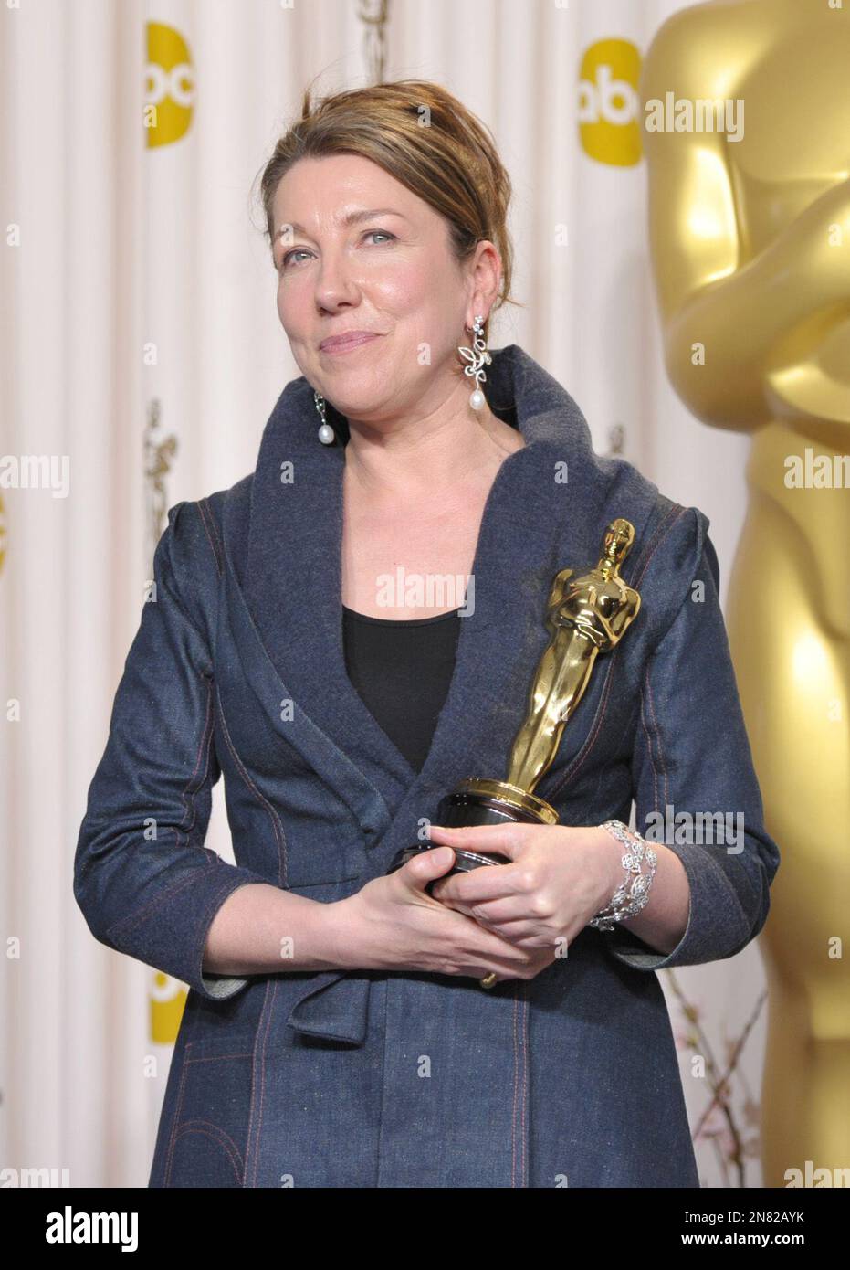Jacqueline Durranposes with her award for best costume design for "Anna ...