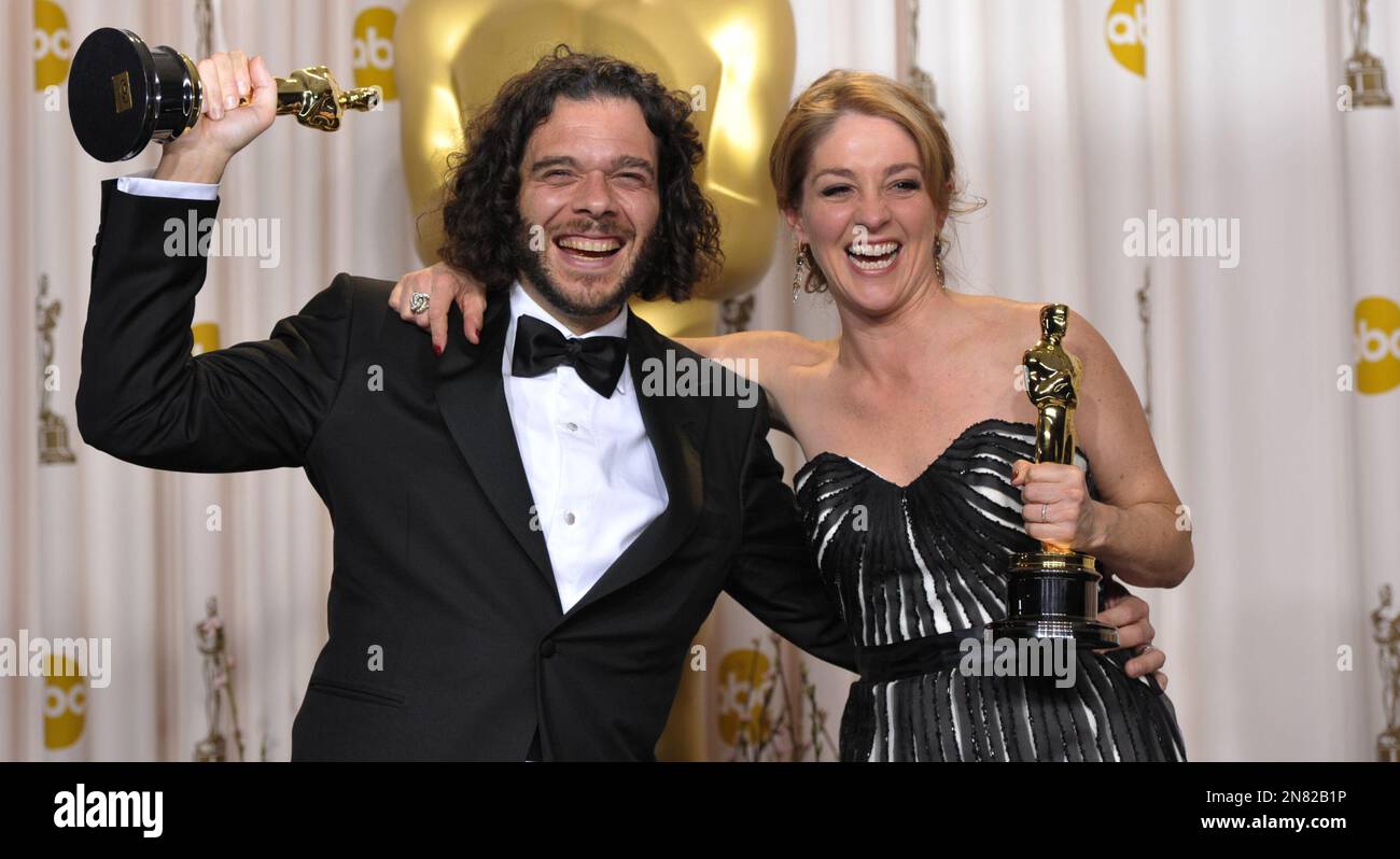 Sean Fine and Andrea Nix Fine pose with their award for best ...