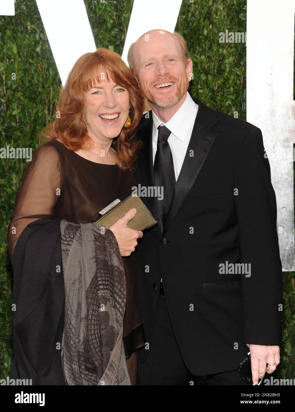 Actor Ron Howard, right, and wife, actress Cheryl Howard arrive at the ...