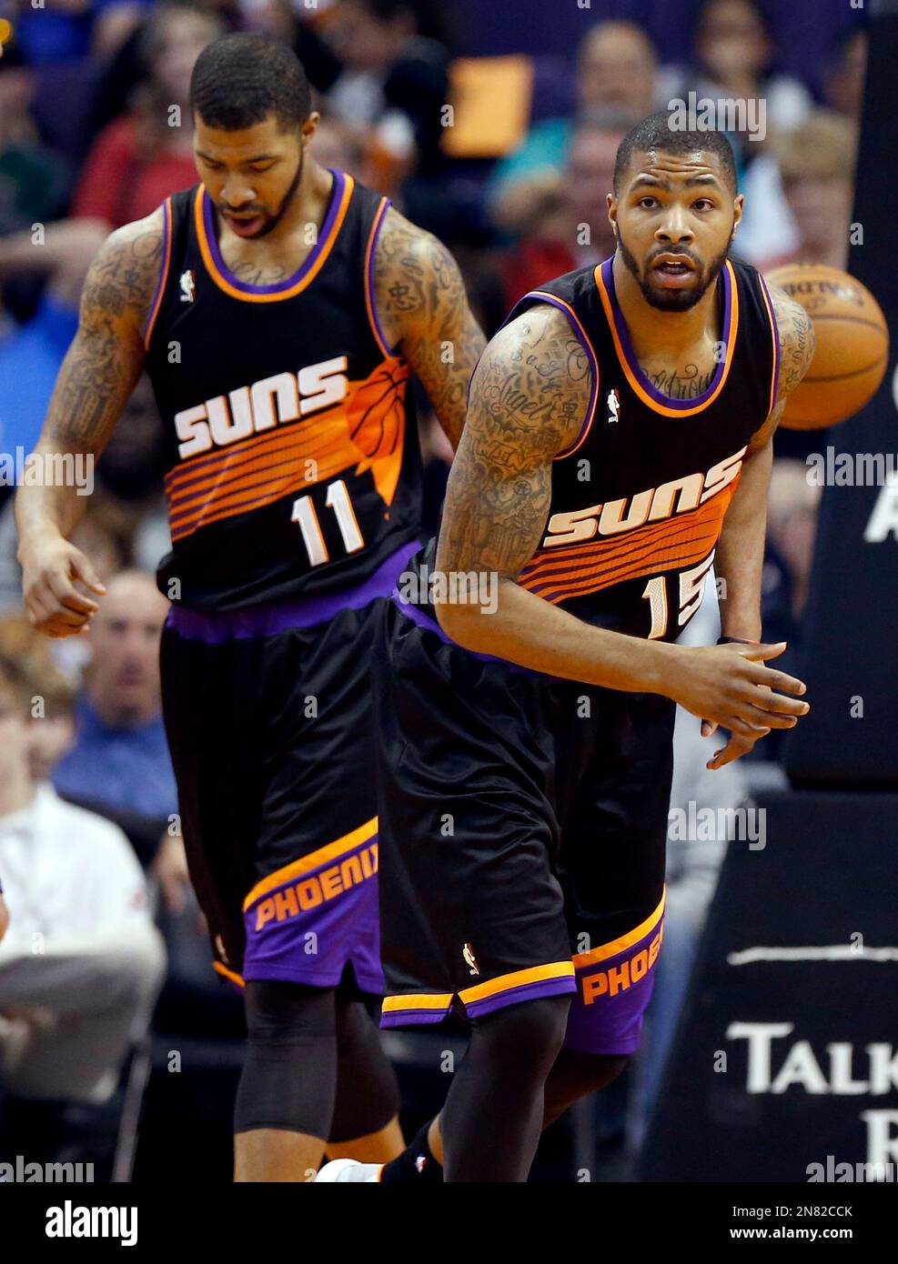 Phoenix Suns' Markieff Morris (11) and his twin brother, Marcus Morris ...