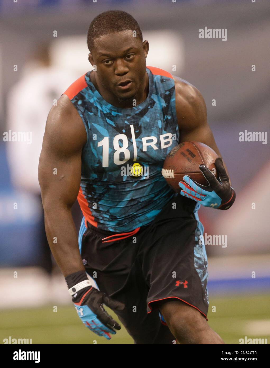 Rutgers running back Jawan Jamison runs a drill during the NFL football ...