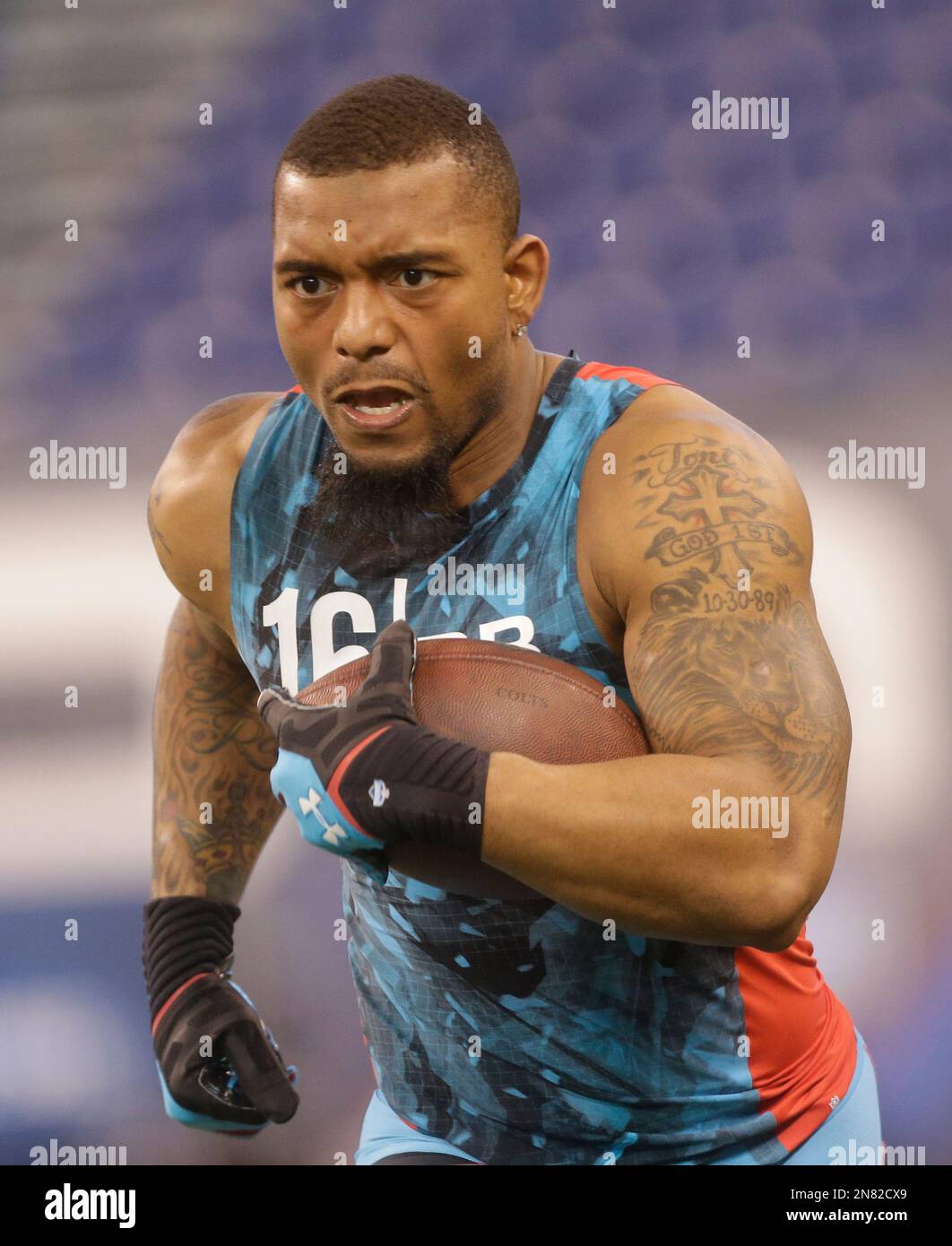 Temple running back Montel Harris runs a drill during the NFL football ...