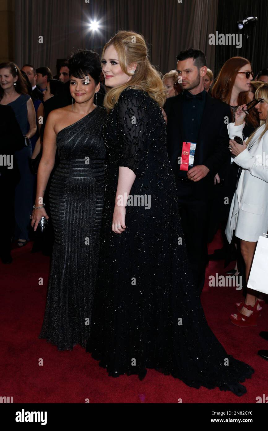 Norah Jones, left, and Adele arrive at the Oscars at the Dolby Theatre on Sunday Feb. 24, 2013 ...
