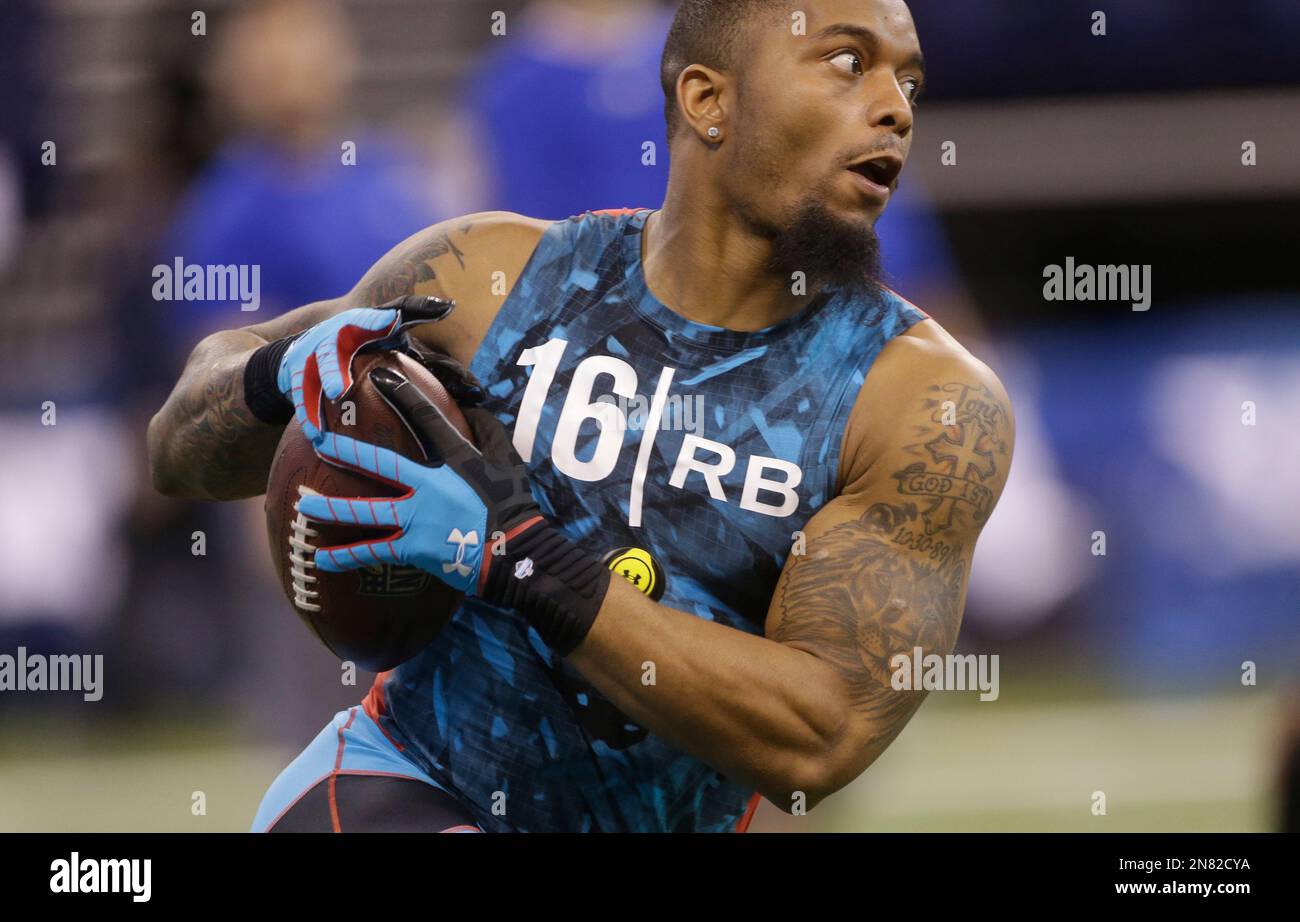 Temple running back Montel Harris runs a drill during the NFL football ...