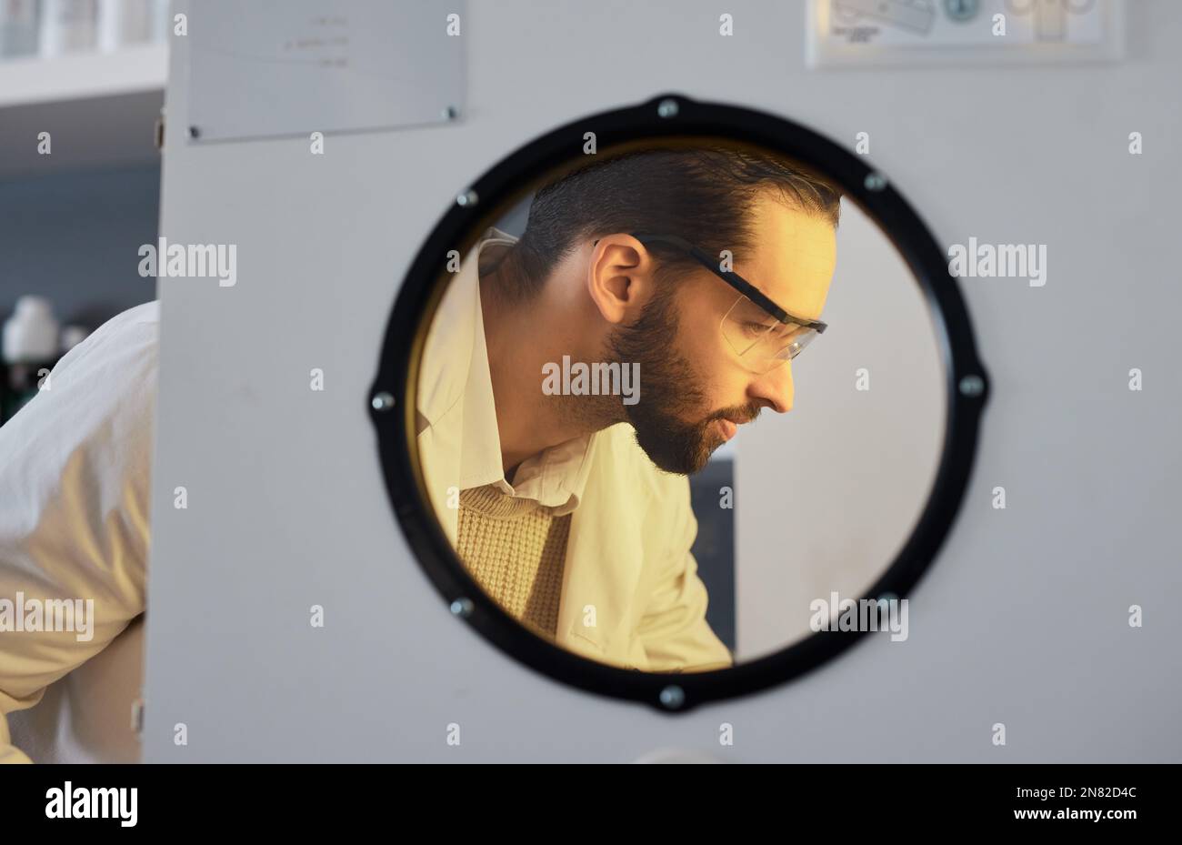 Scientist, man with incubator and science experiment with medical ...