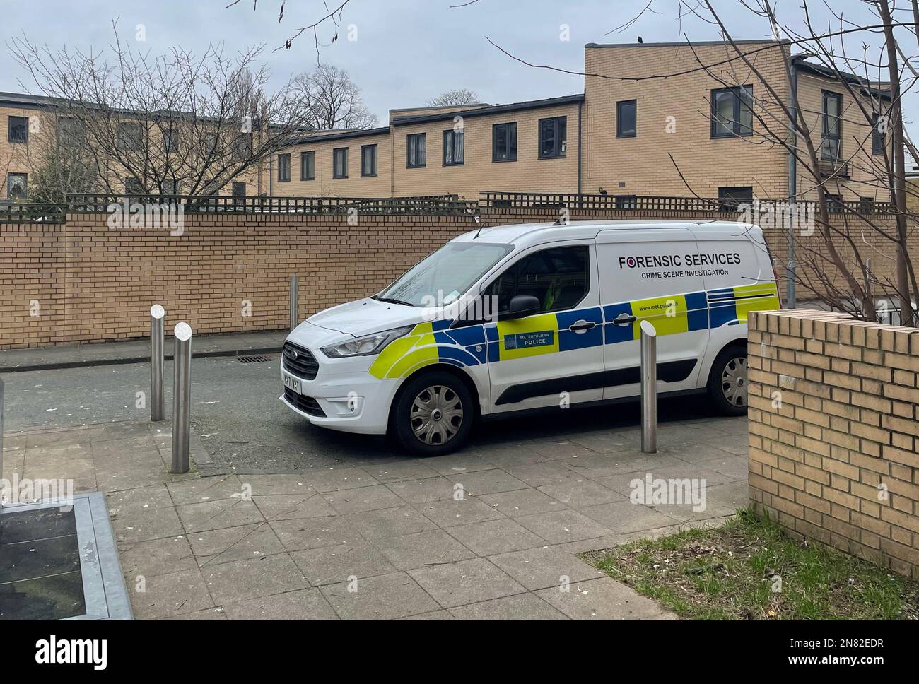 A police forensics van at the scene on Hicken Road in Brixton, London ...