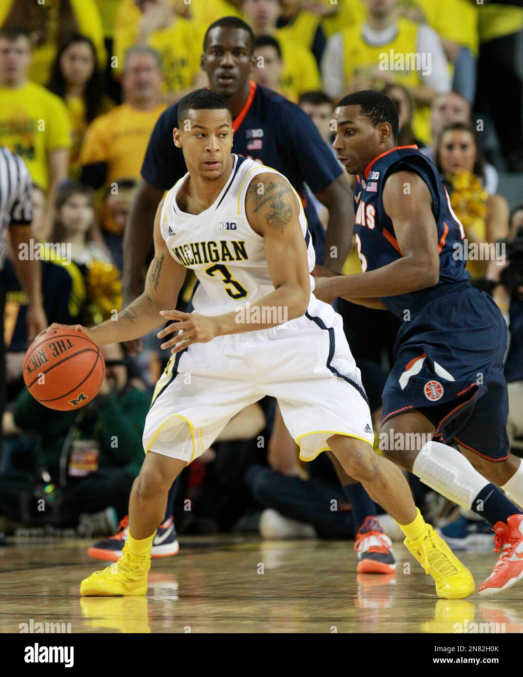 Michigan guard Trey Burke (3) looks to pass during the first half of an ...
