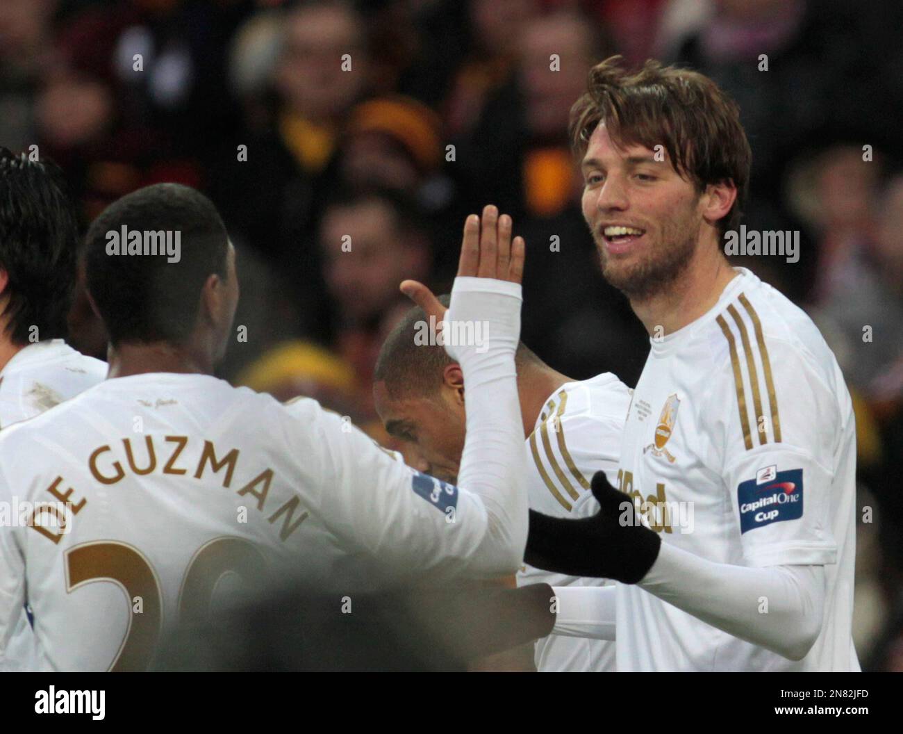 Swansea City's Miguel Michu, right, celebrates his goal against ...