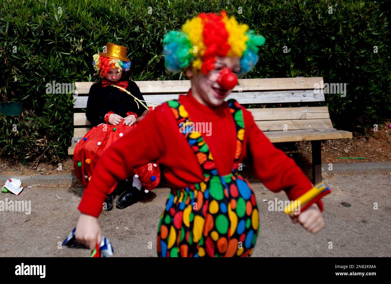 Two Ultra Orthodox Jewish boys dress as clowns during the Purim ...