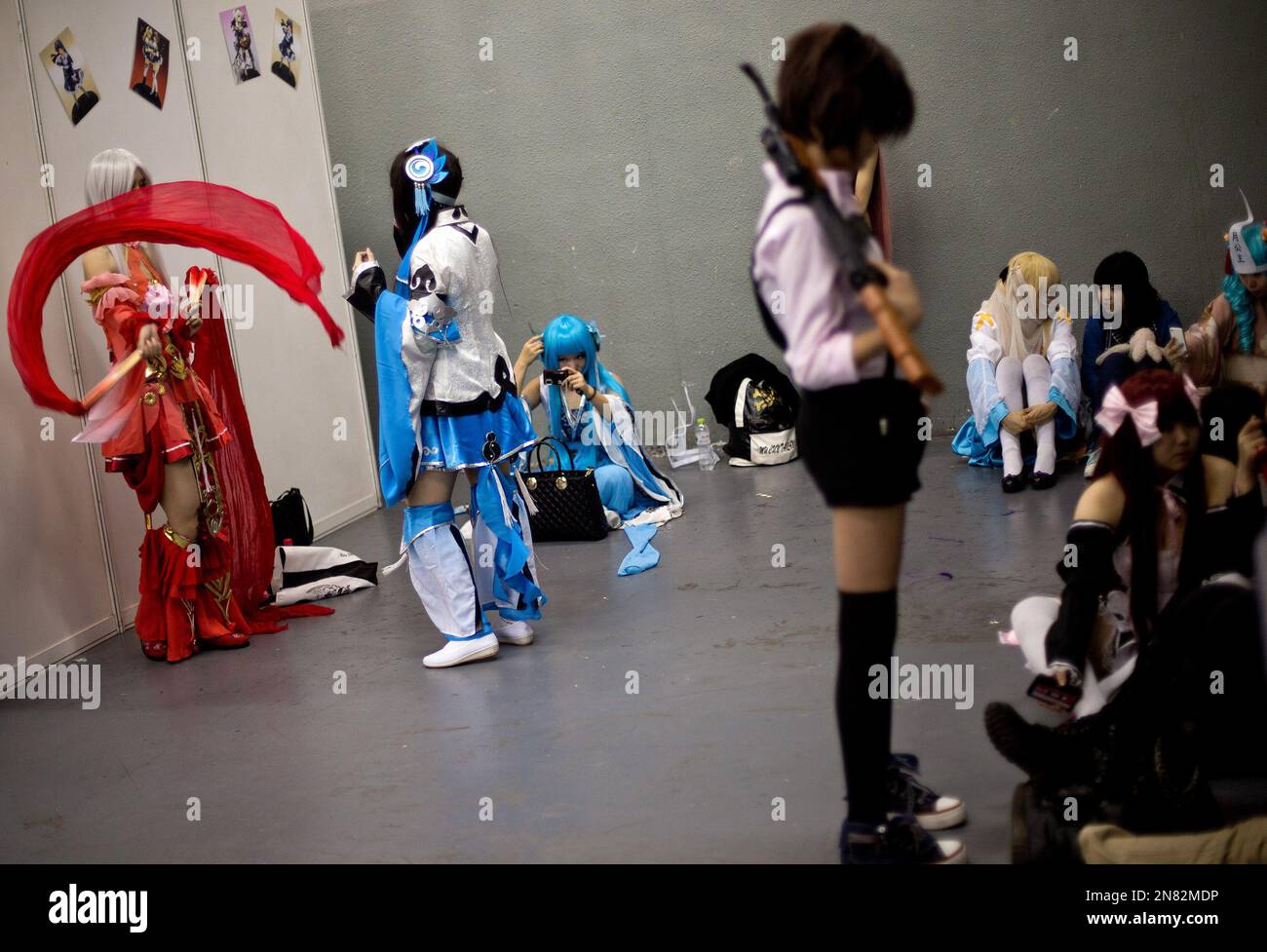 Chinese cosplay enthusiasts prepare to take part in the Animation and ...