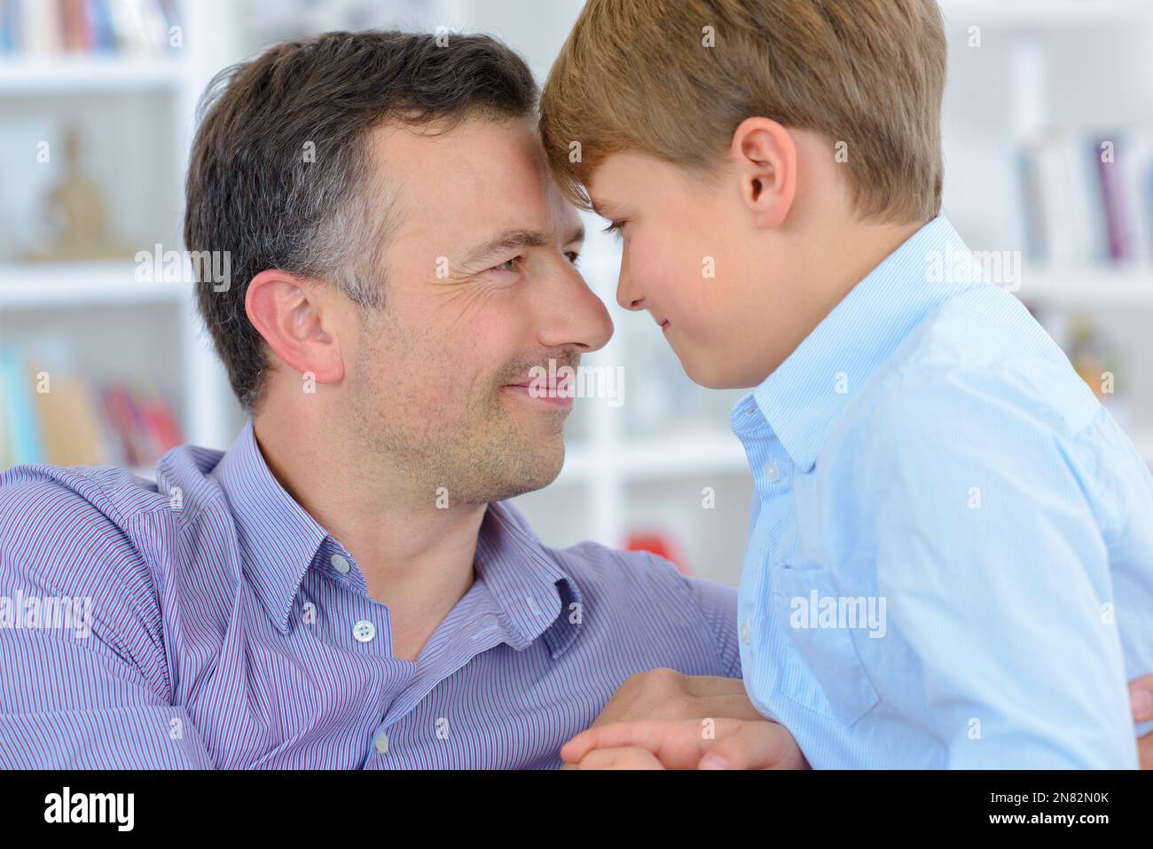 a man is parenting his son Stock Photo - Alamy