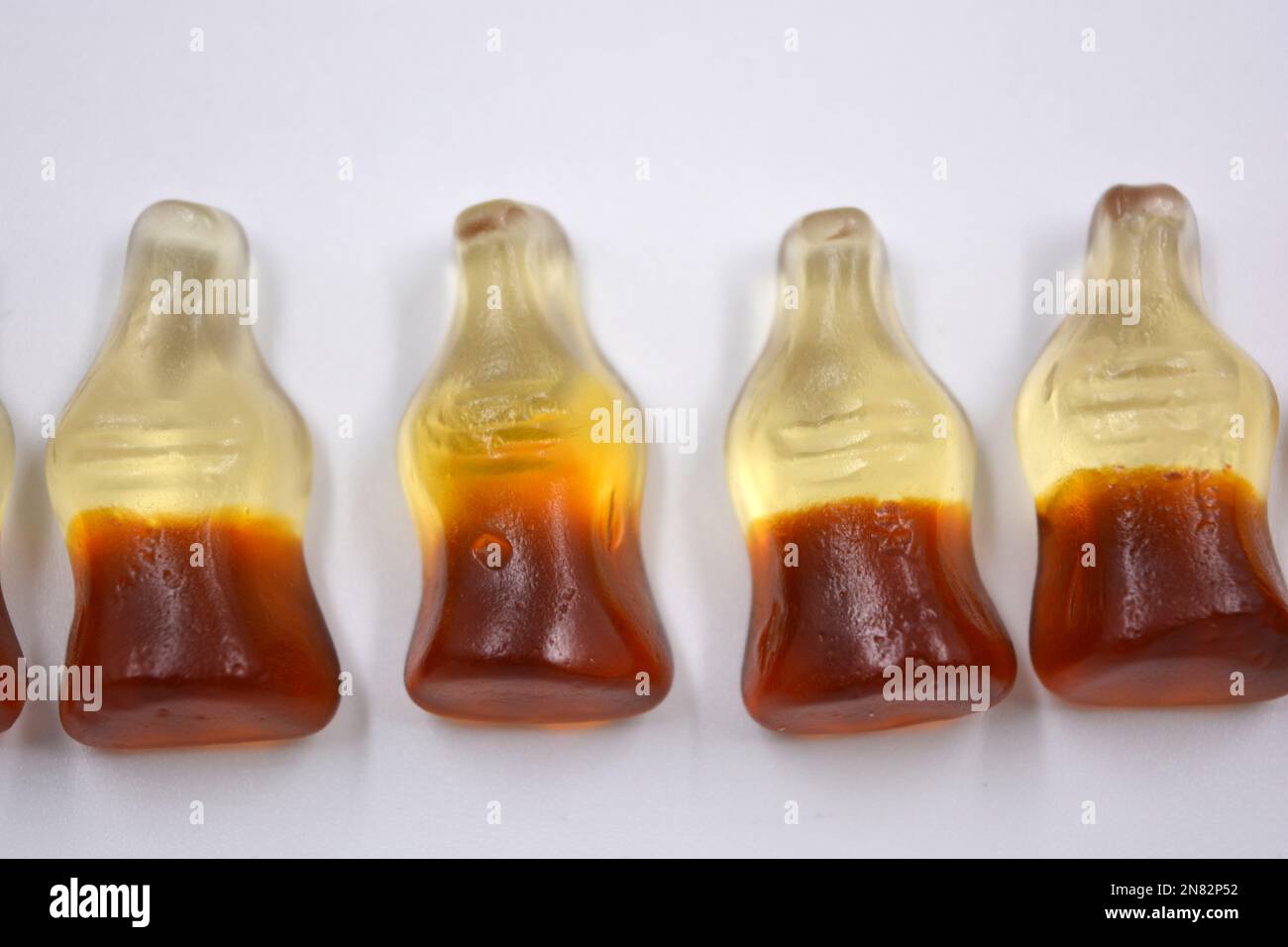 Bright children's chewing, jelly sweets in the form of drinks, bottles ...