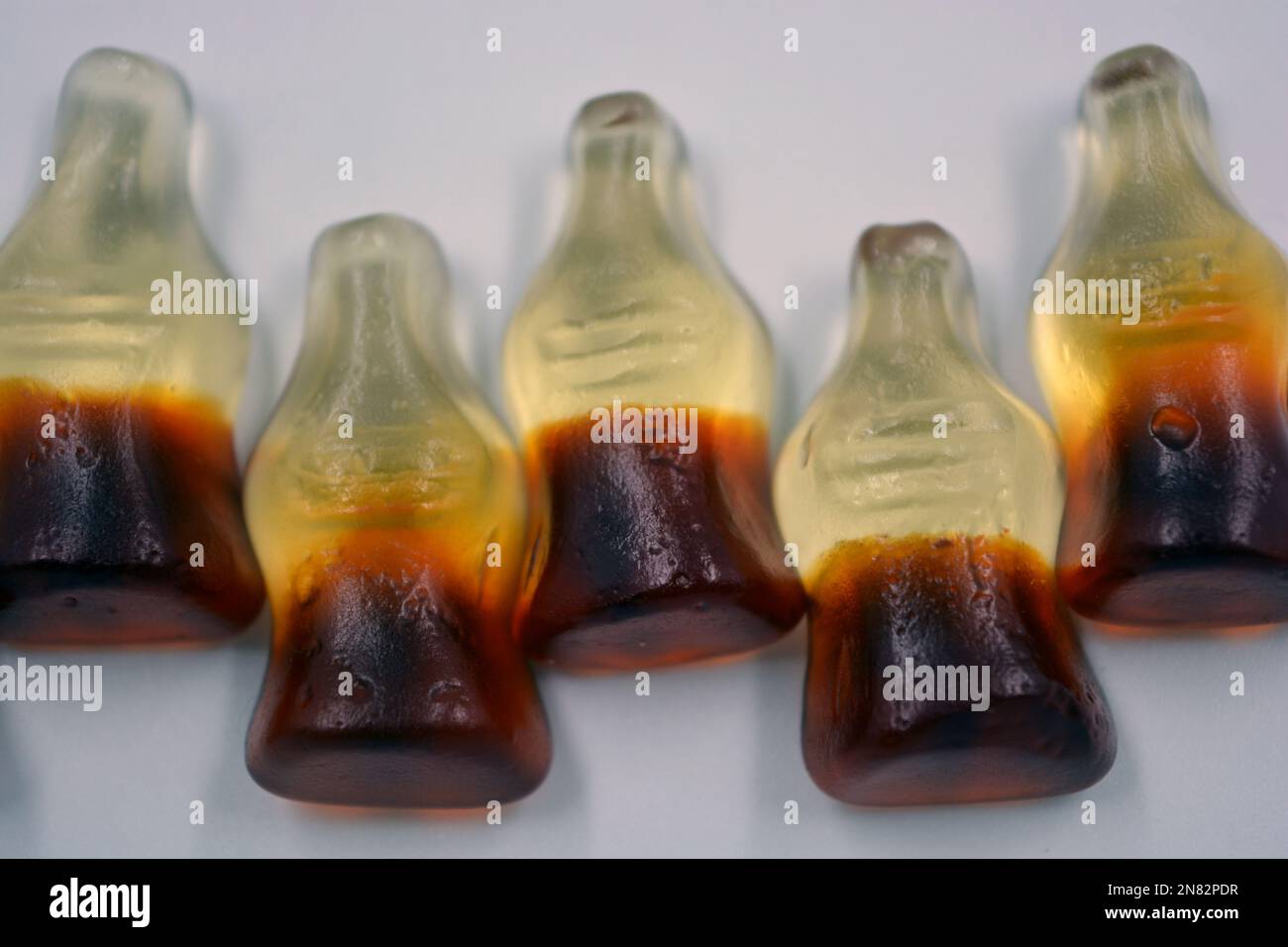 Bright children's chewing, jelly sweets in the form of drinks, bottles ...