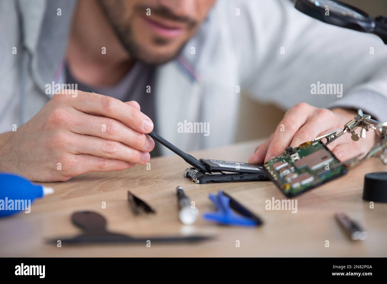 Close up of technician repairing a desktop computer hi-res stock ...