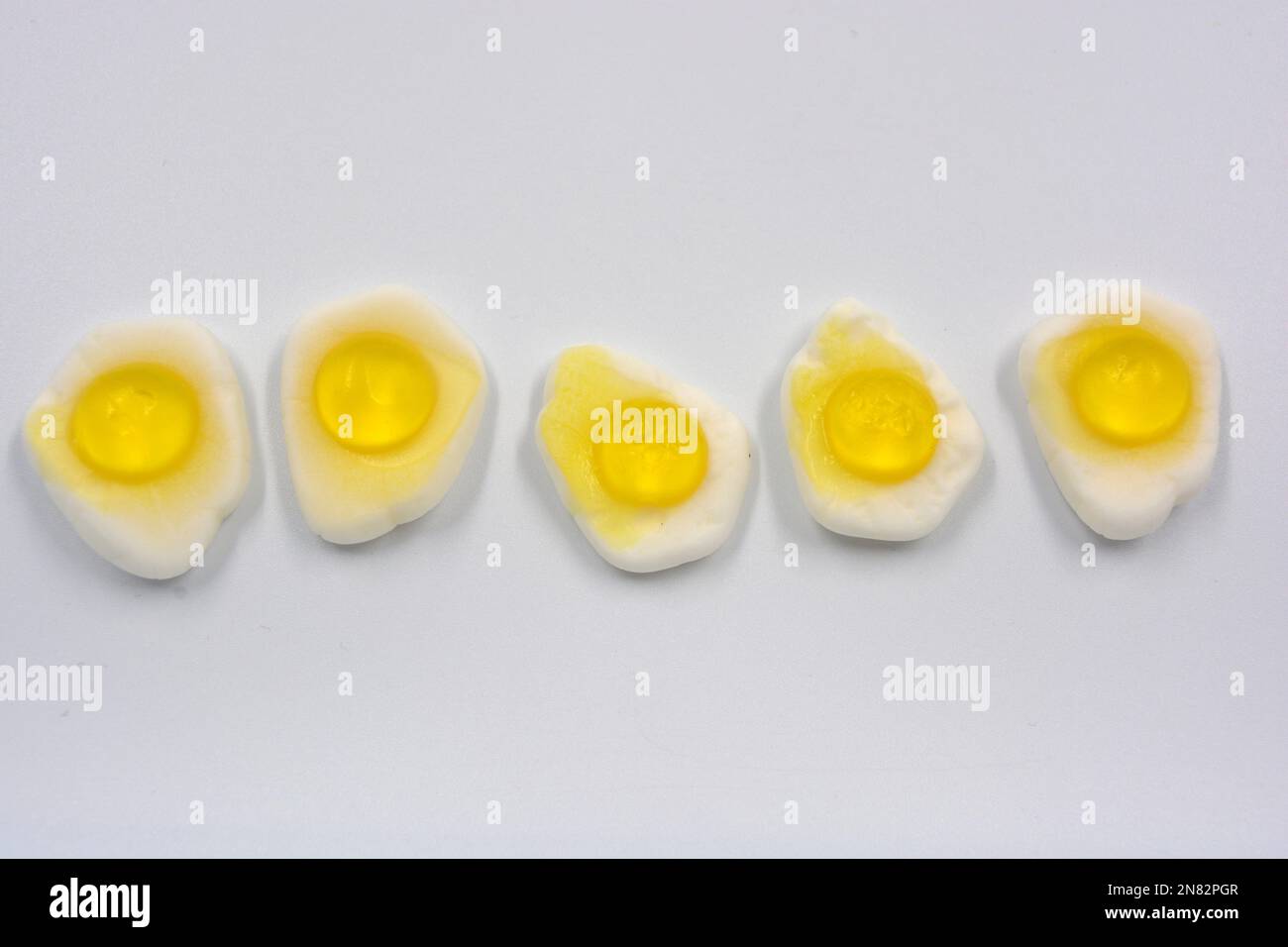 Bright children's chewing, jelly candies in the form of food and the ...