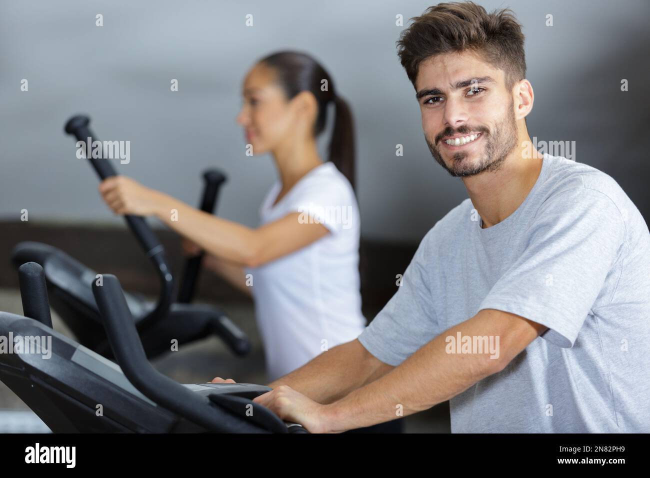 people running in machine treadmill at fitness gym club Stock Photo - Alamy