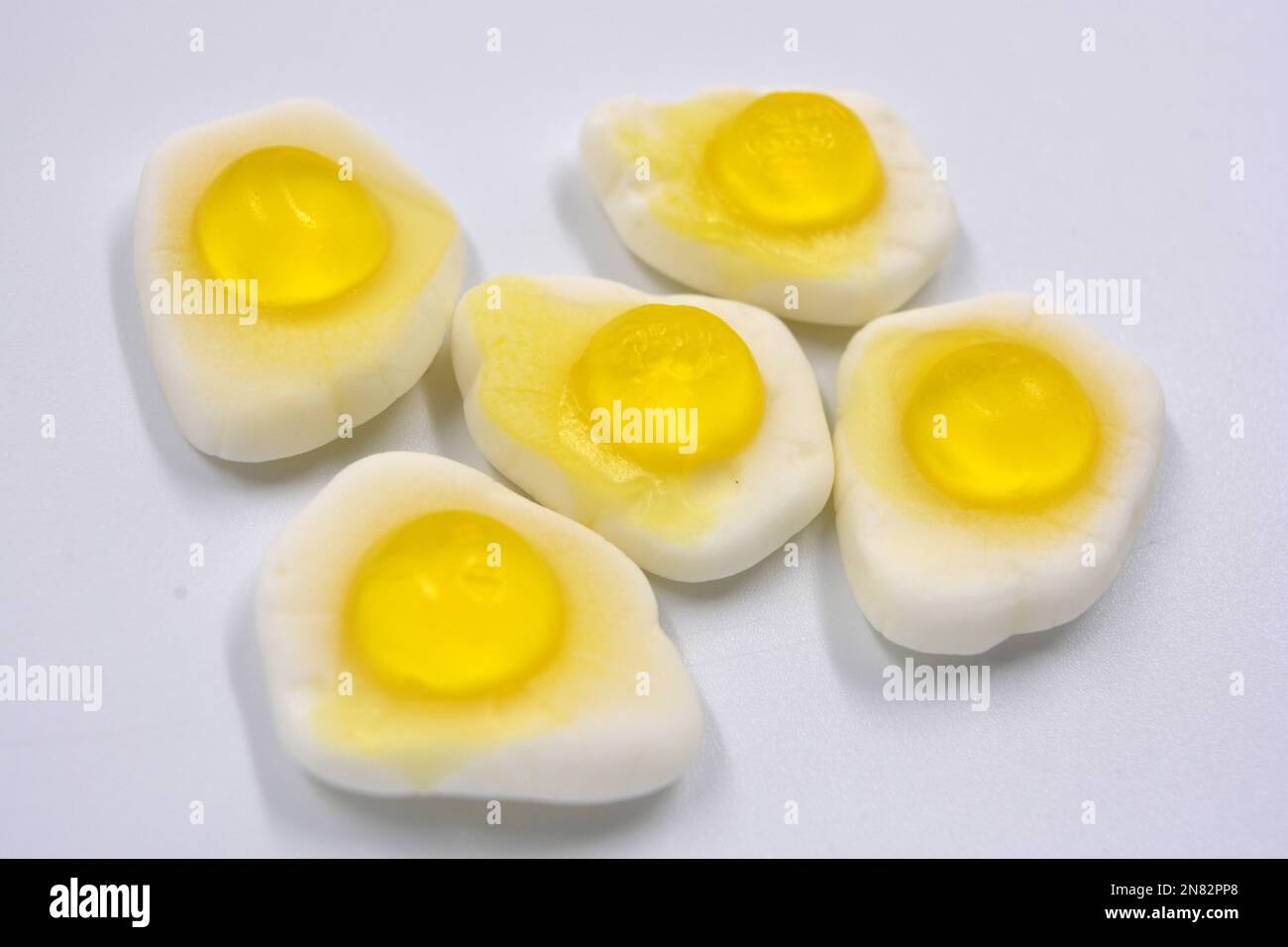 Bright children's chewing, jelly candies in the form of food and the ...