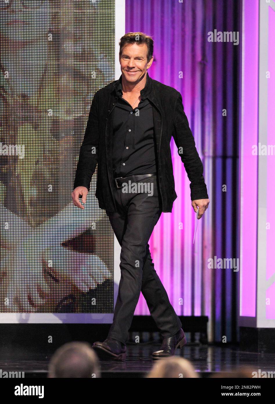 Dennis Quaid is seen on stage to present the award for best feature at the Independent Spirit ...