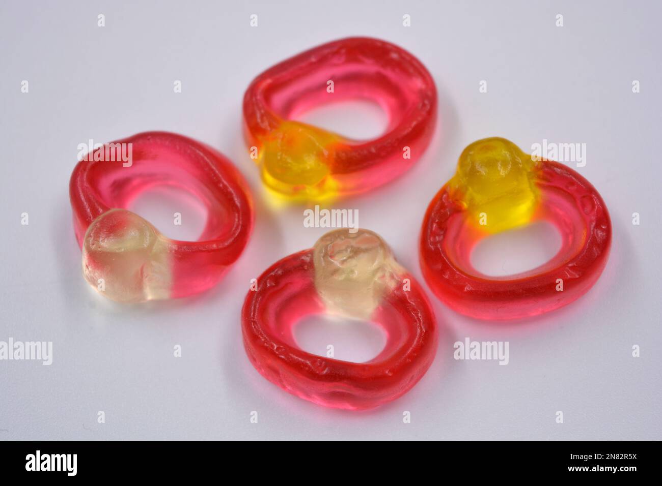 Bright children's colored chewing, jelly candies in the form and in the ...