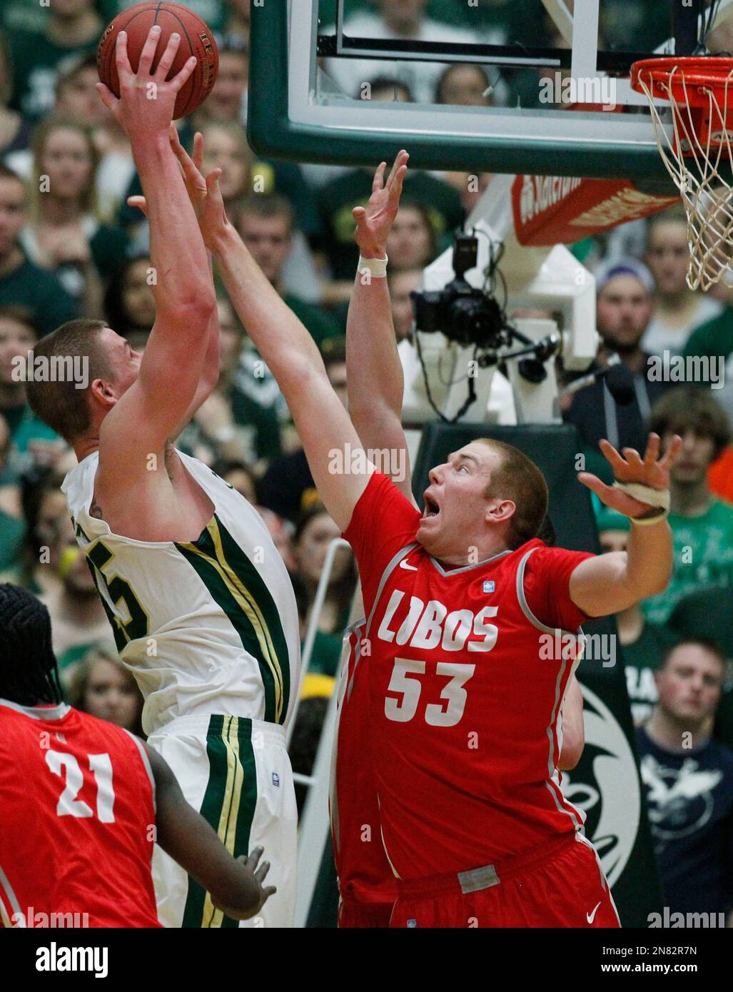 Colorado State center Colton Iverson, left, goes up for a shot over New ...