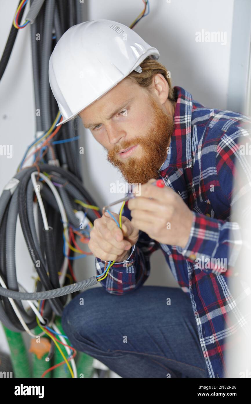 Electrician repairing switch board hi-res stock photography and images ...