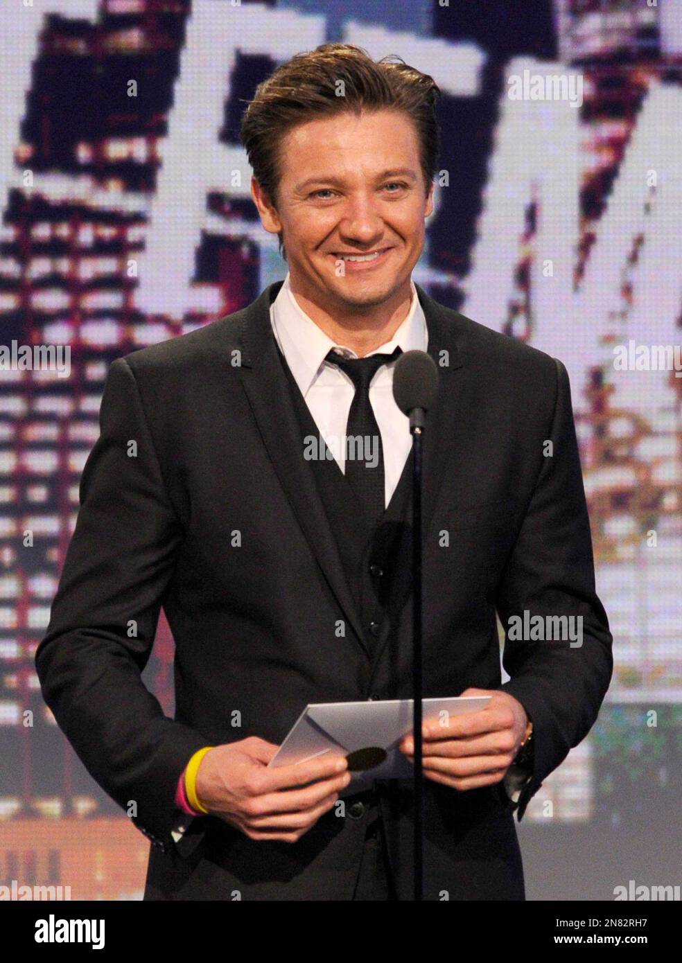 Actor Jeremy Renner presents the award for best female lead at the ...