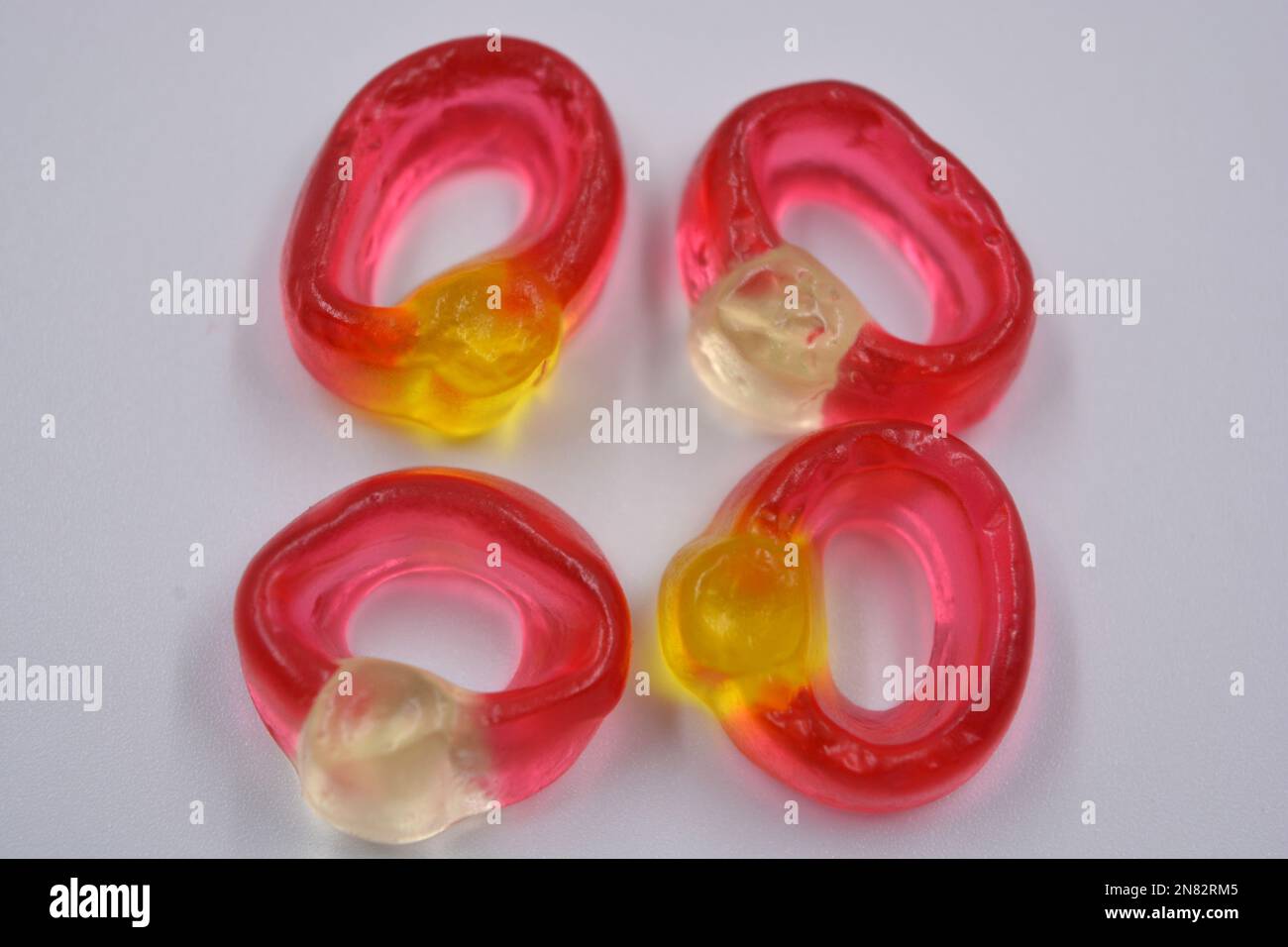 Bright children's colored chewing, jelly candies in the form and in the ...