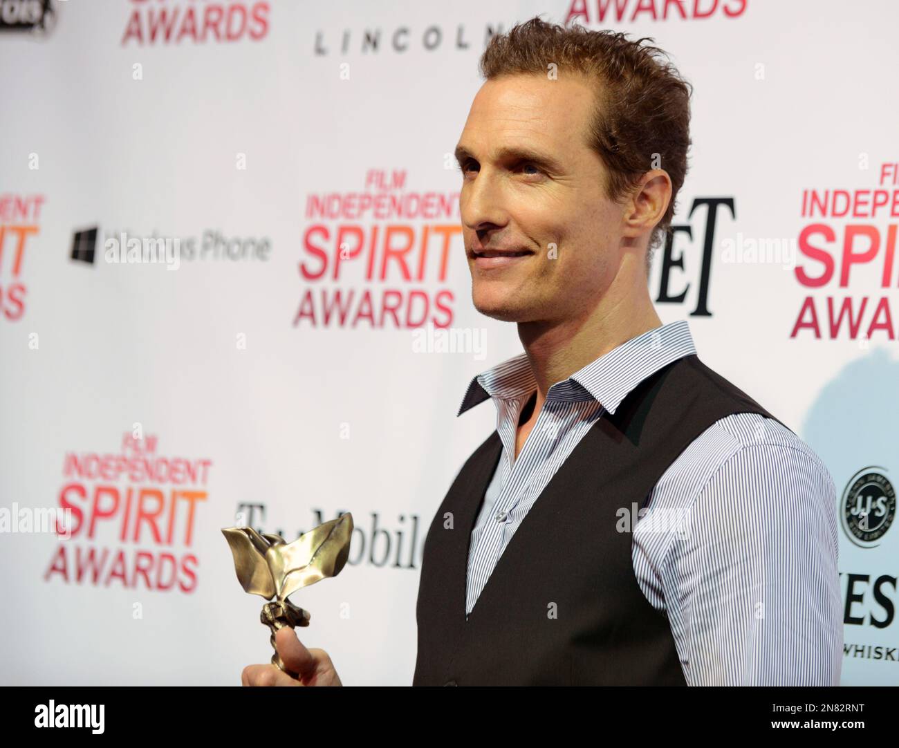 Matthew McConaughey poses backstage with the award for best supporting ...