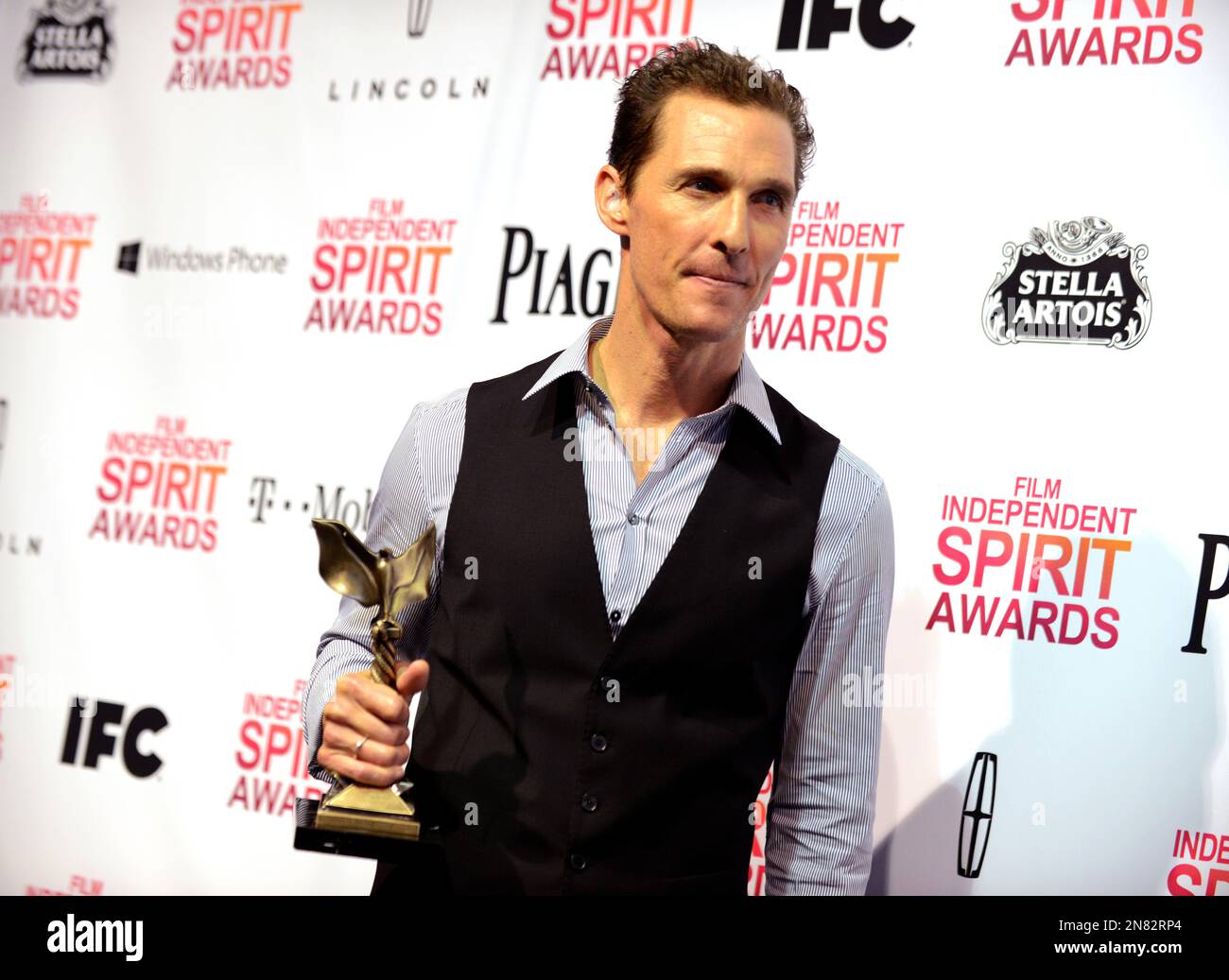 Matthew McConaughey poses backstage with the award for best supporting ...