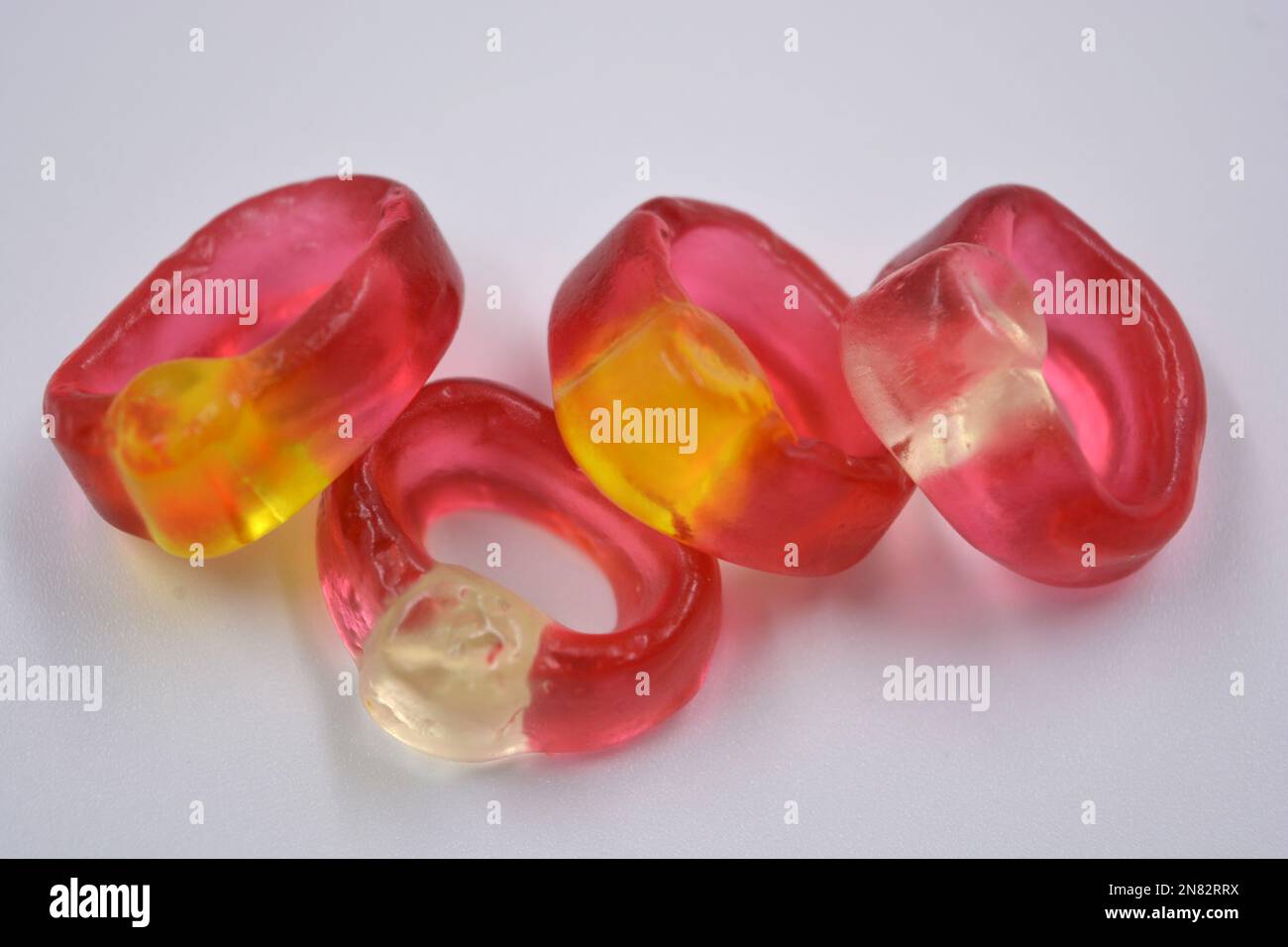 Bright children's colored chewing, jelly candies in the form and in the ...