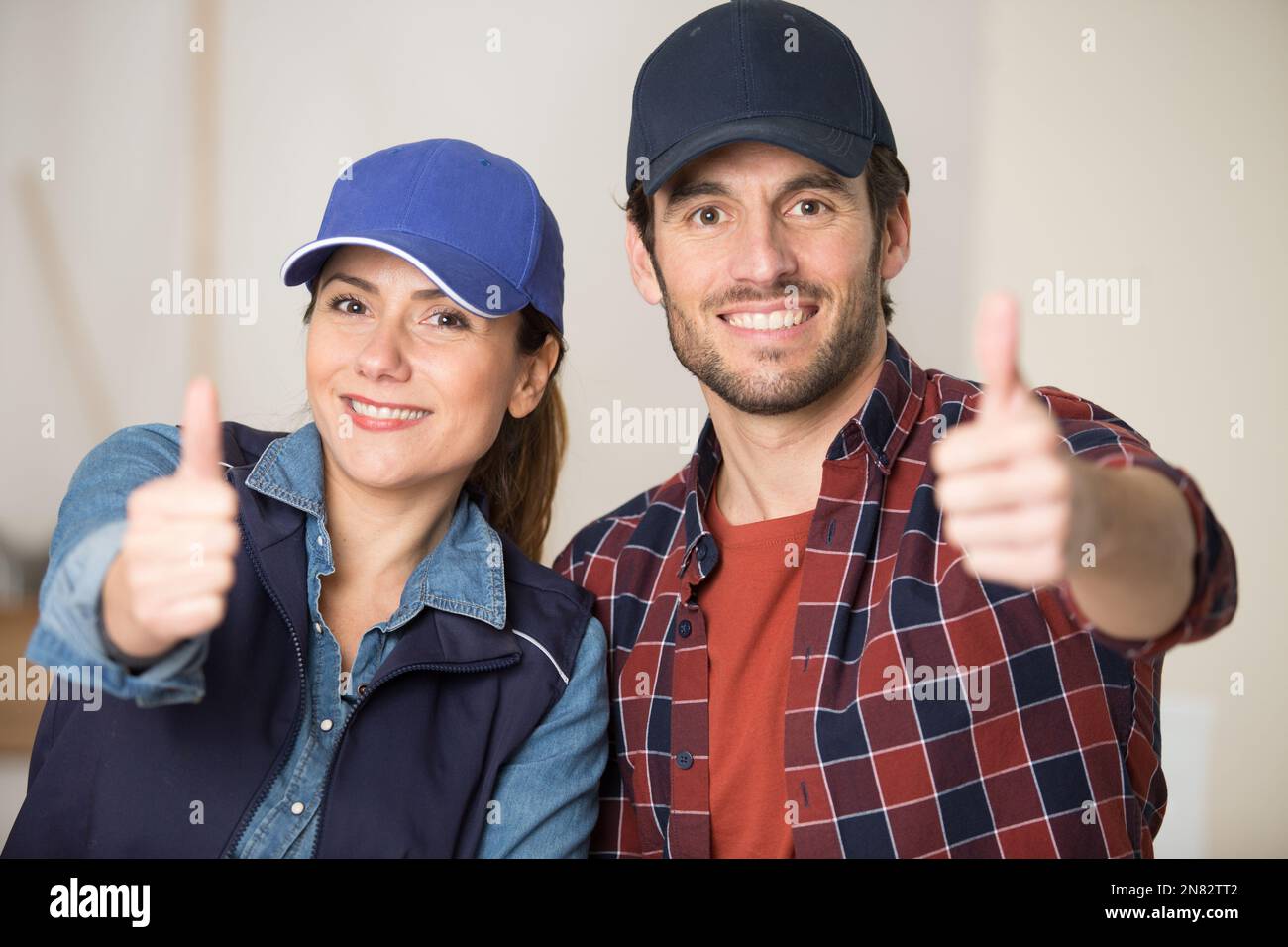 builder architect engineer as friendly team giving thumb up Stock Photo ...