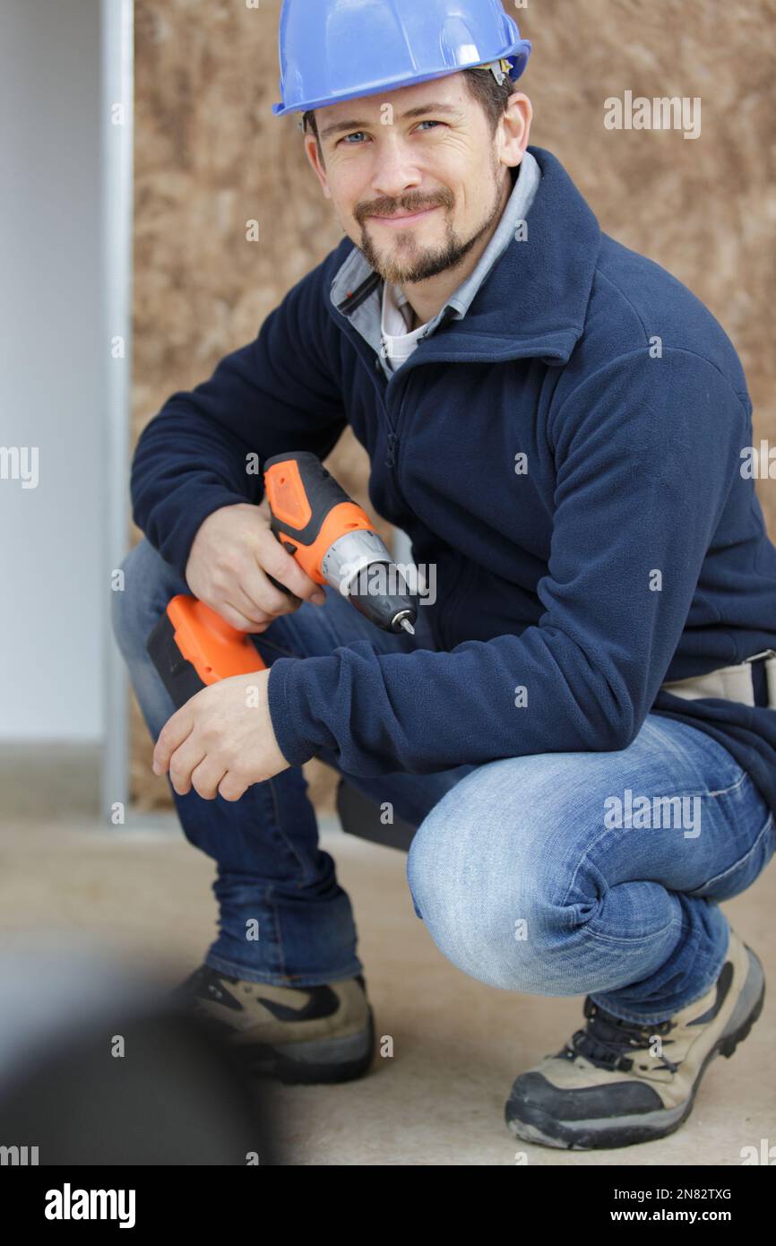 a handyman using cordless drill Stock Photo - Alamy