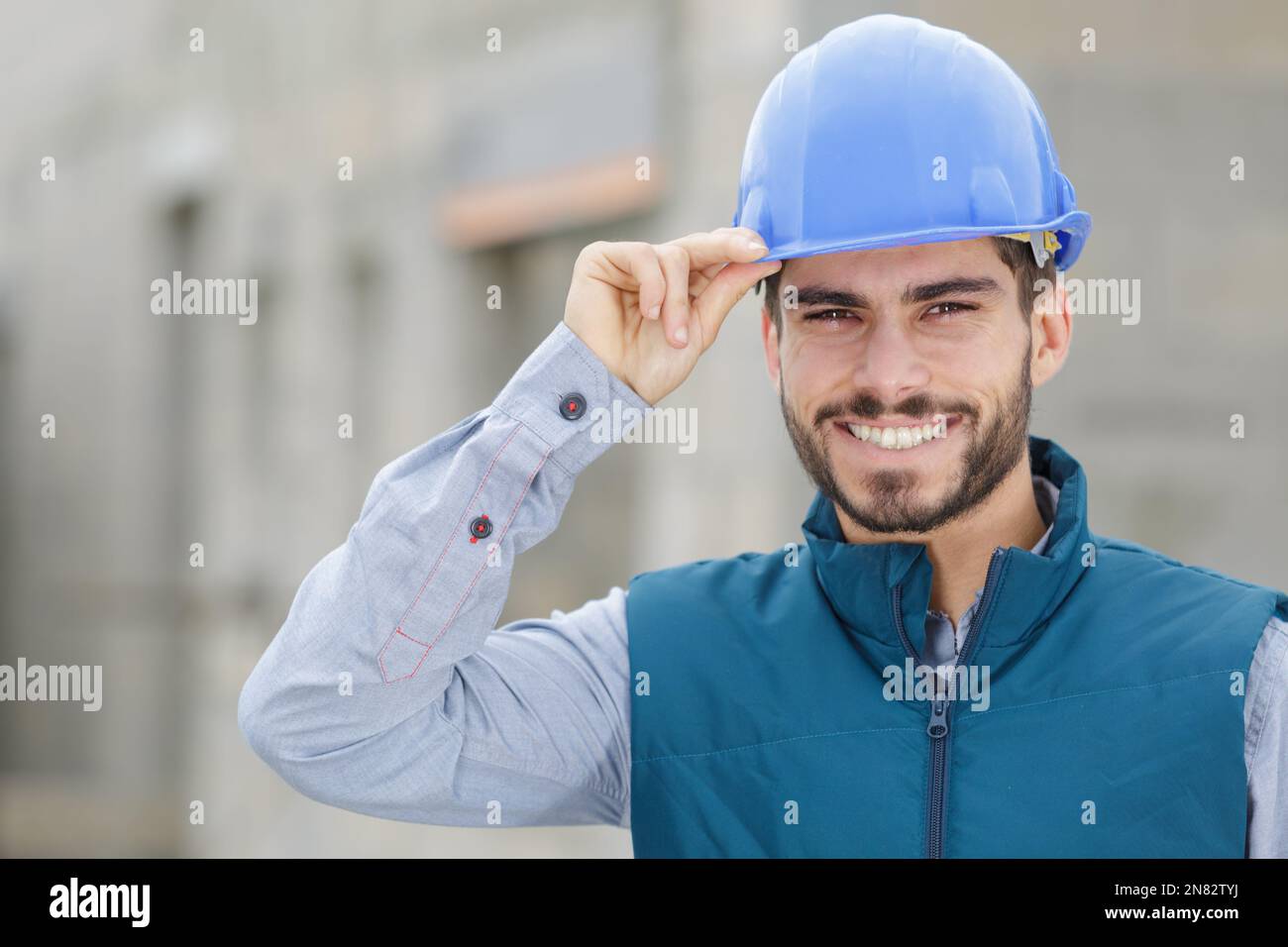 joyful handsome worker at work Stock Photo - Alamy